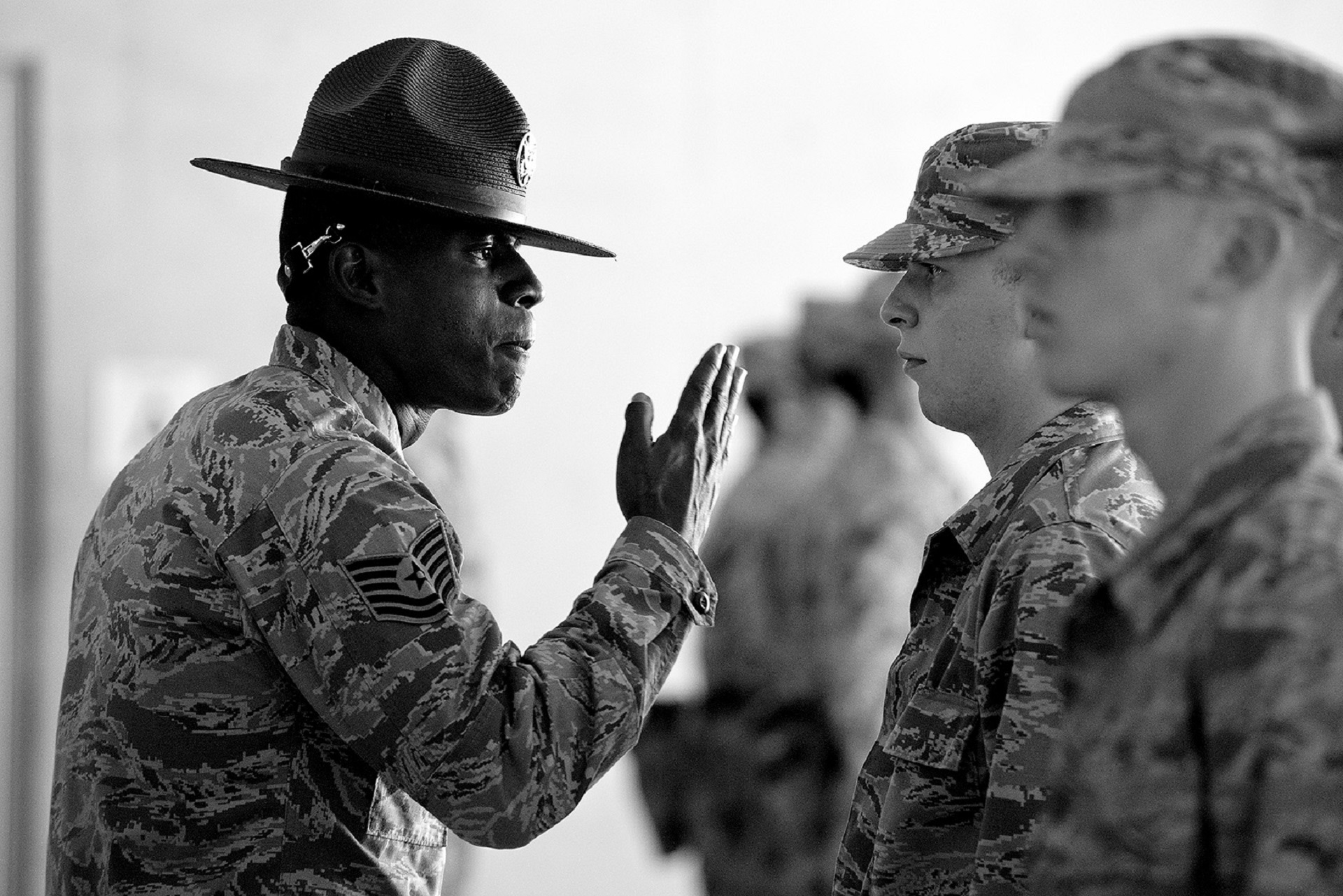 Black and white photo of the military training instructor in hat and ...