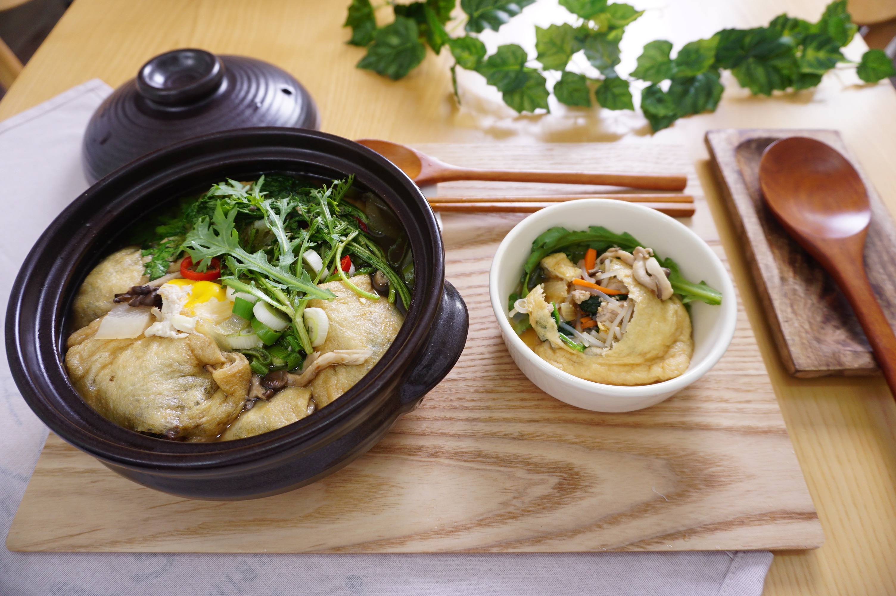 Beautiful tang fish cakes with kamaboko, on the wooden board, served on ...