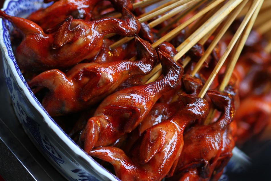 Roast quail on a stick free image download
