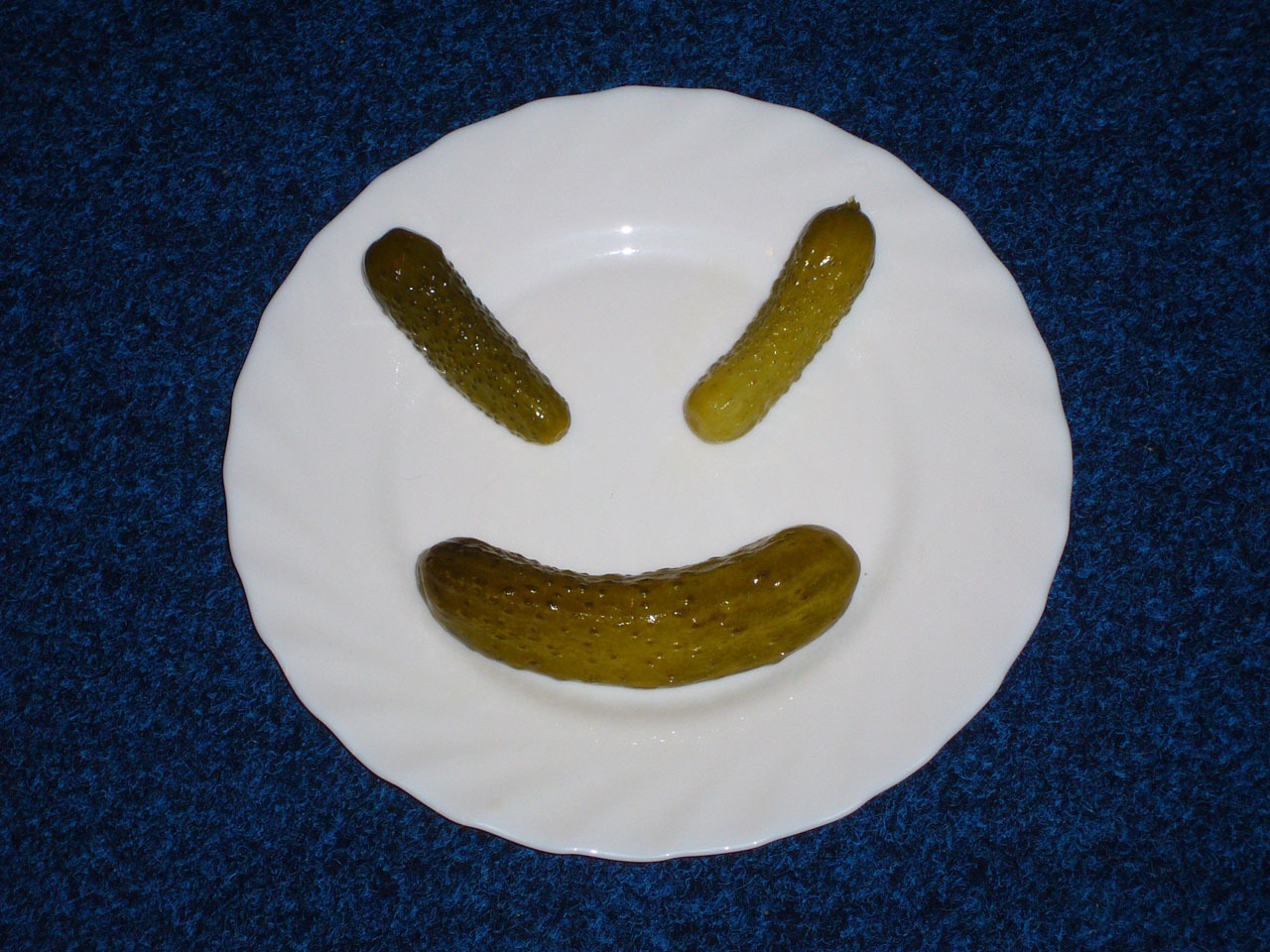 Three pickles on a plate free image download