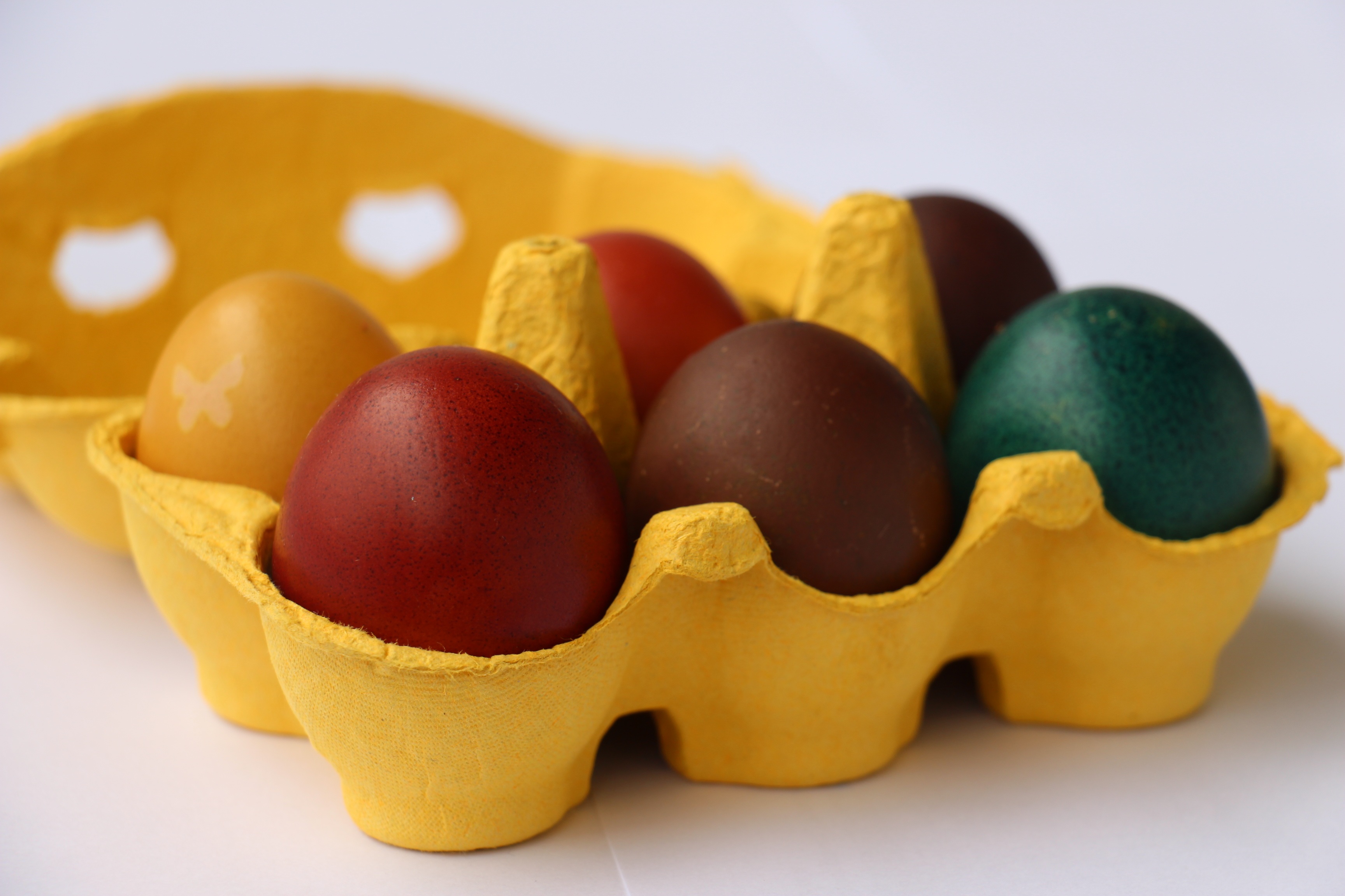 Colored eggs in yellow box free image download