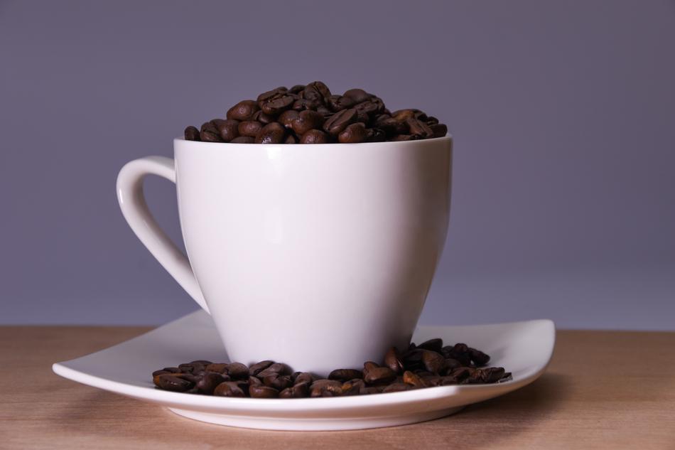 Coffee beans overflowing the cup free image download