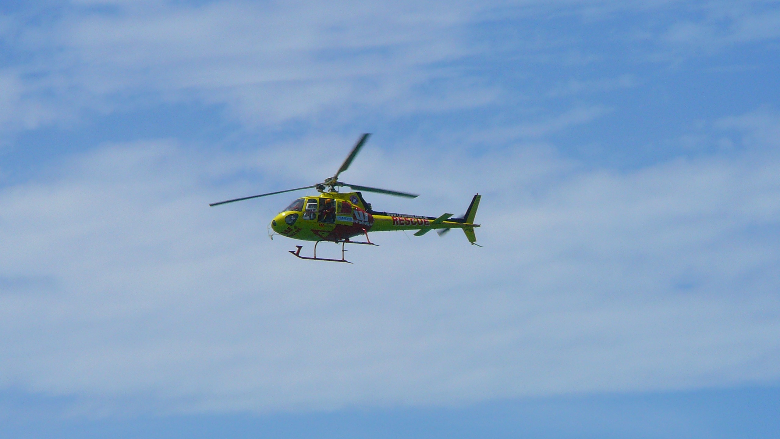Rescue medical helicopter high up in the sky free image download