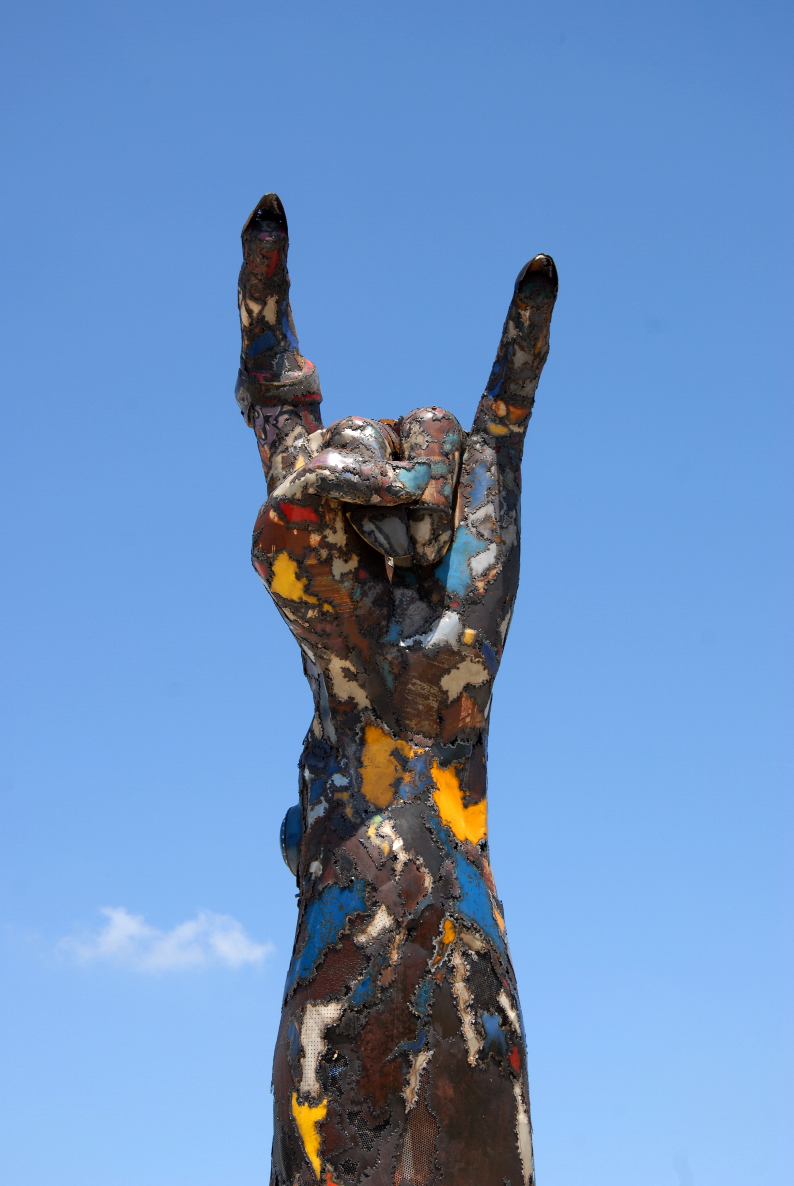 Hard-Rock, hand sign, painted sculpture at sky free image download