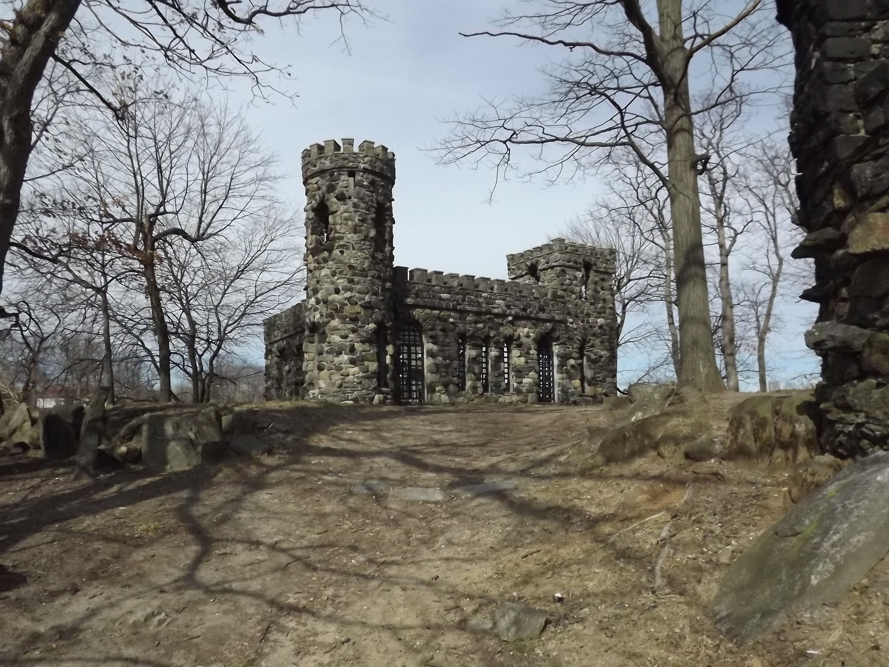 Beautiful, stone castle, among the trees on landscape free image download