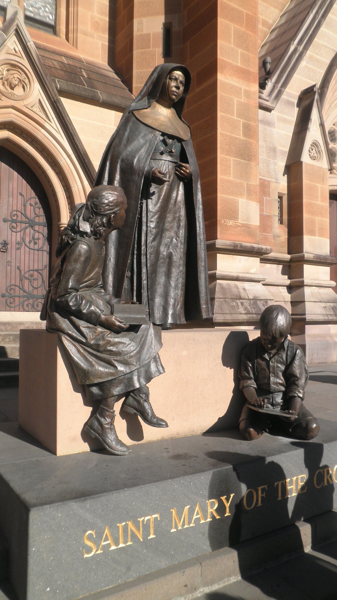 Sculptures of saints near the building free image download