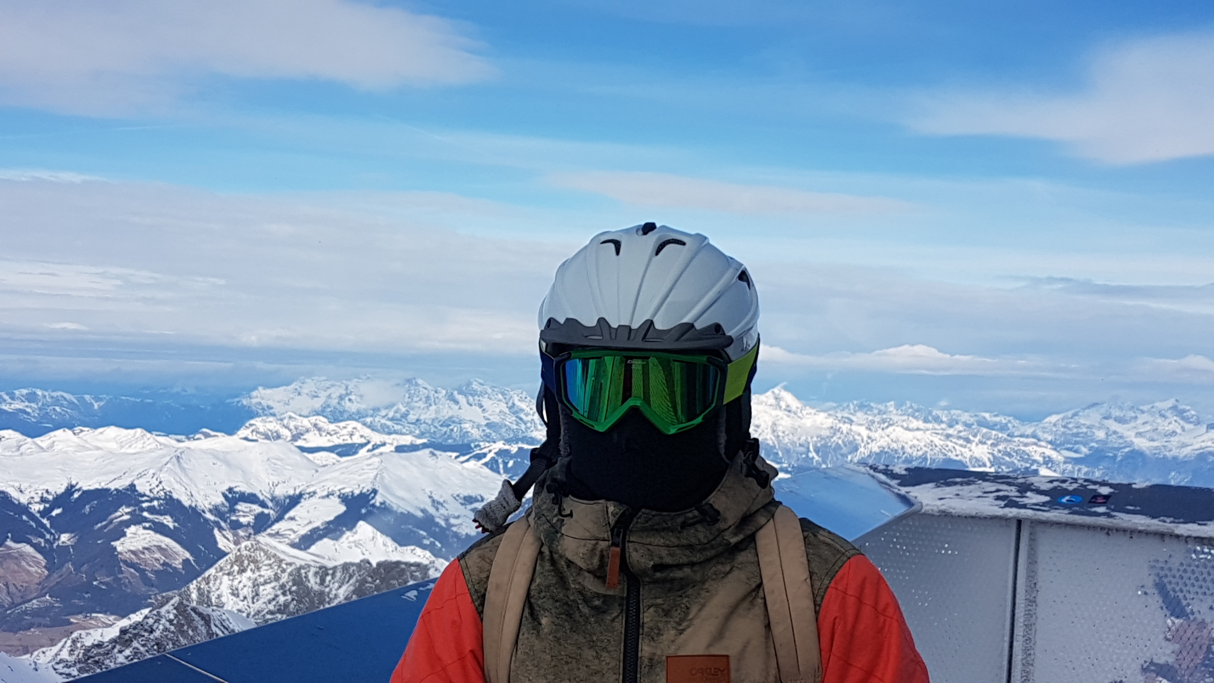 Photo of a tourist wearing a helmet and ski goggles free image download