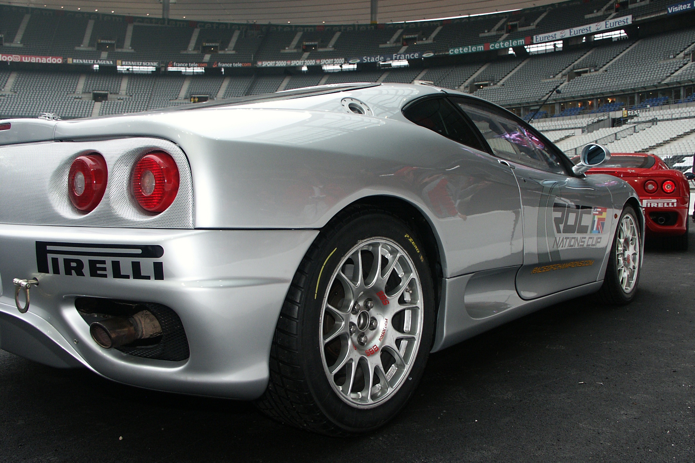 Beautiful, shiny, silver and red "Ferrari" racing cars free image download