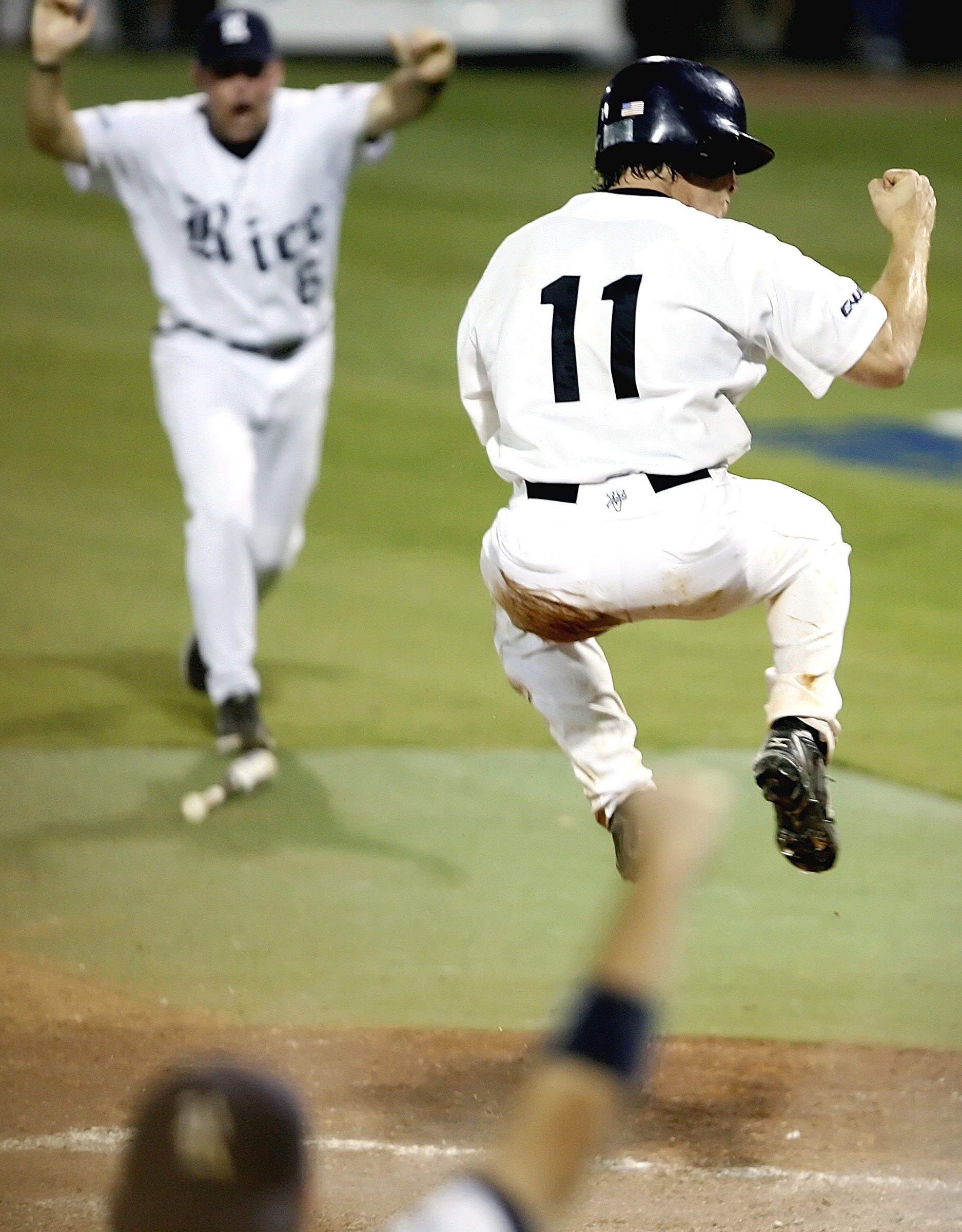 Celebration of the baseball players in white and black uniform, on the ...
