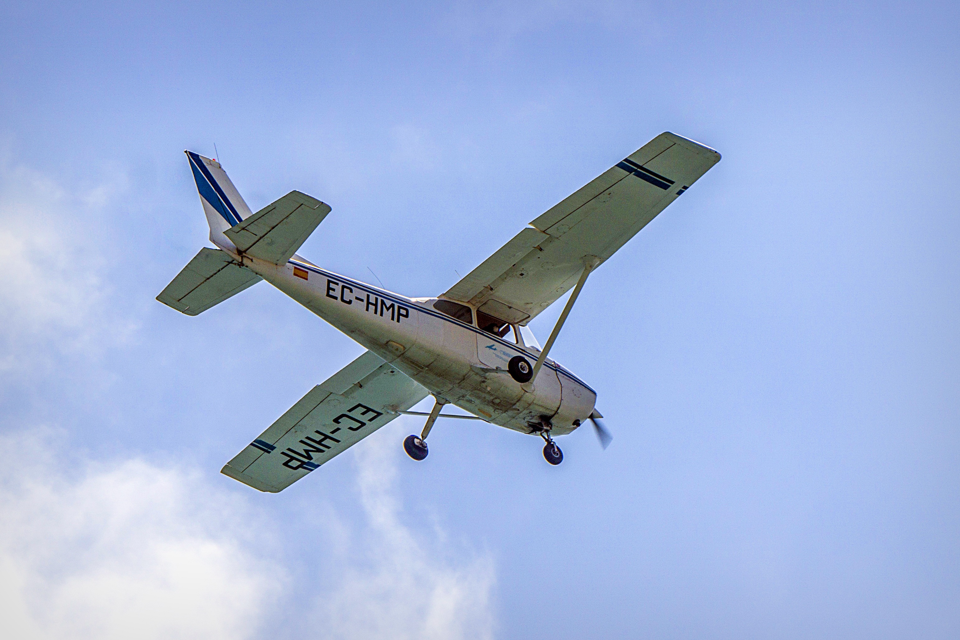 Bottom view of small Plane in flight free image download