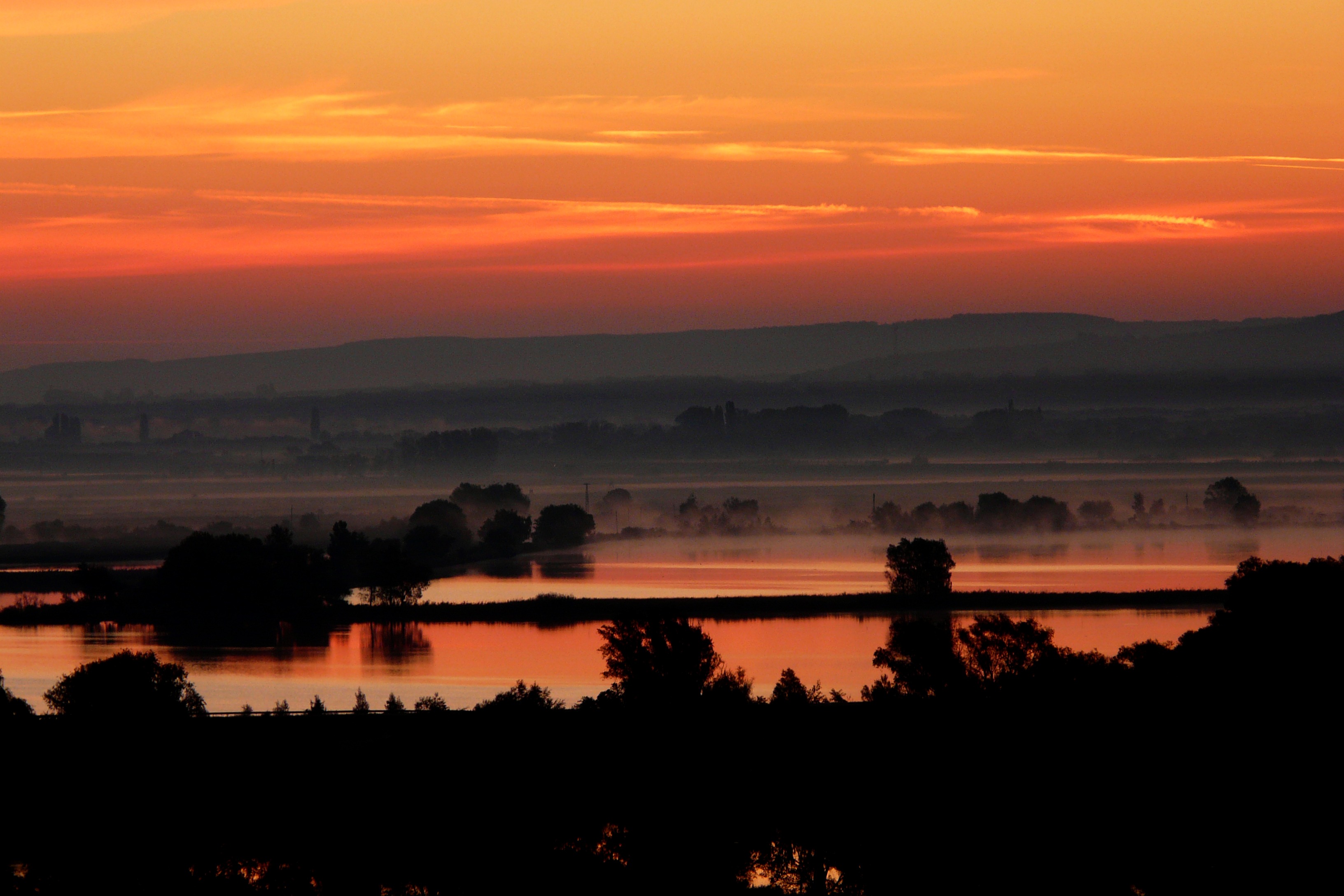 Pink sunset over a lake in Croatia free image download