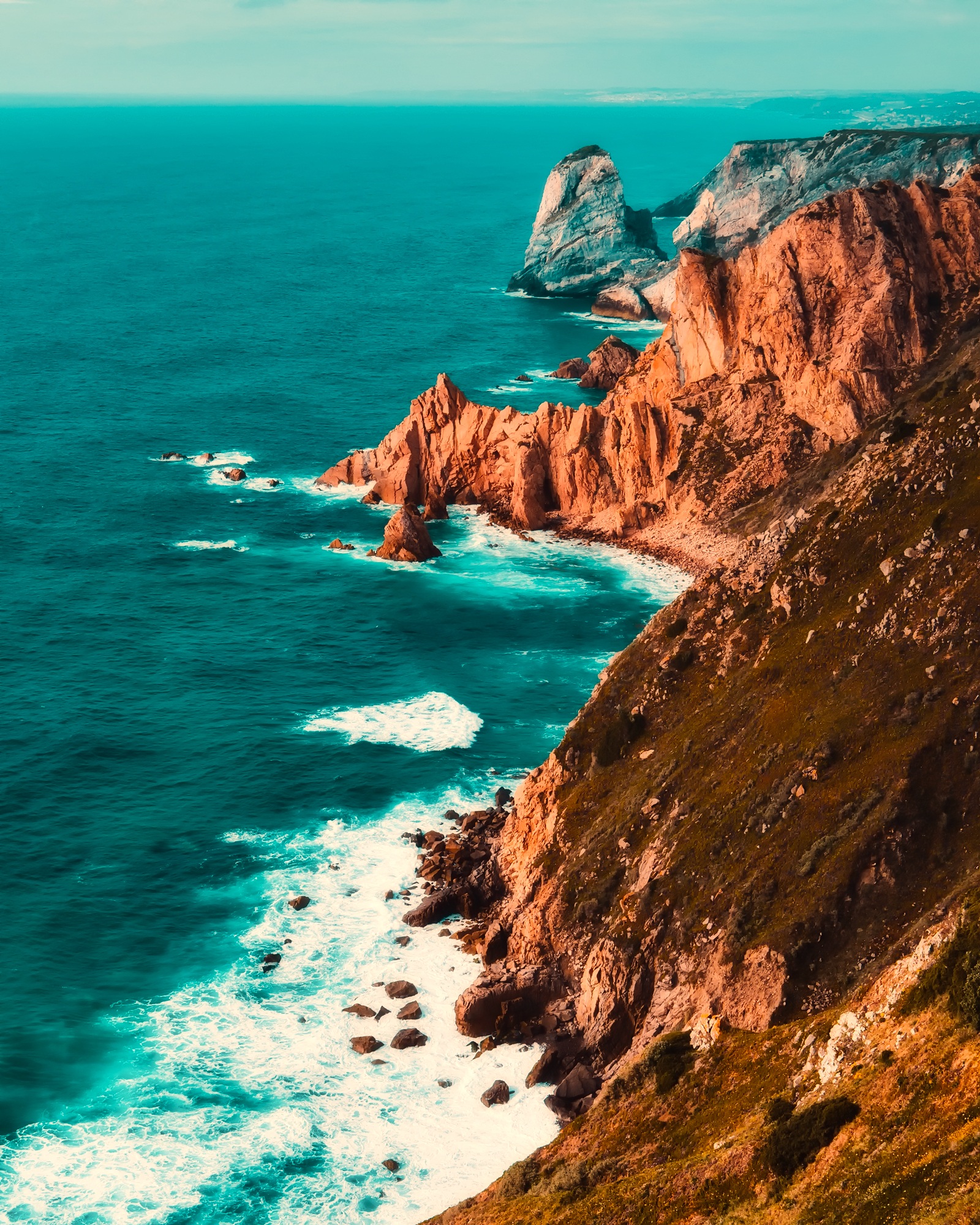 Beautiful and colorful coast of Portugal with mountains and waves free ...