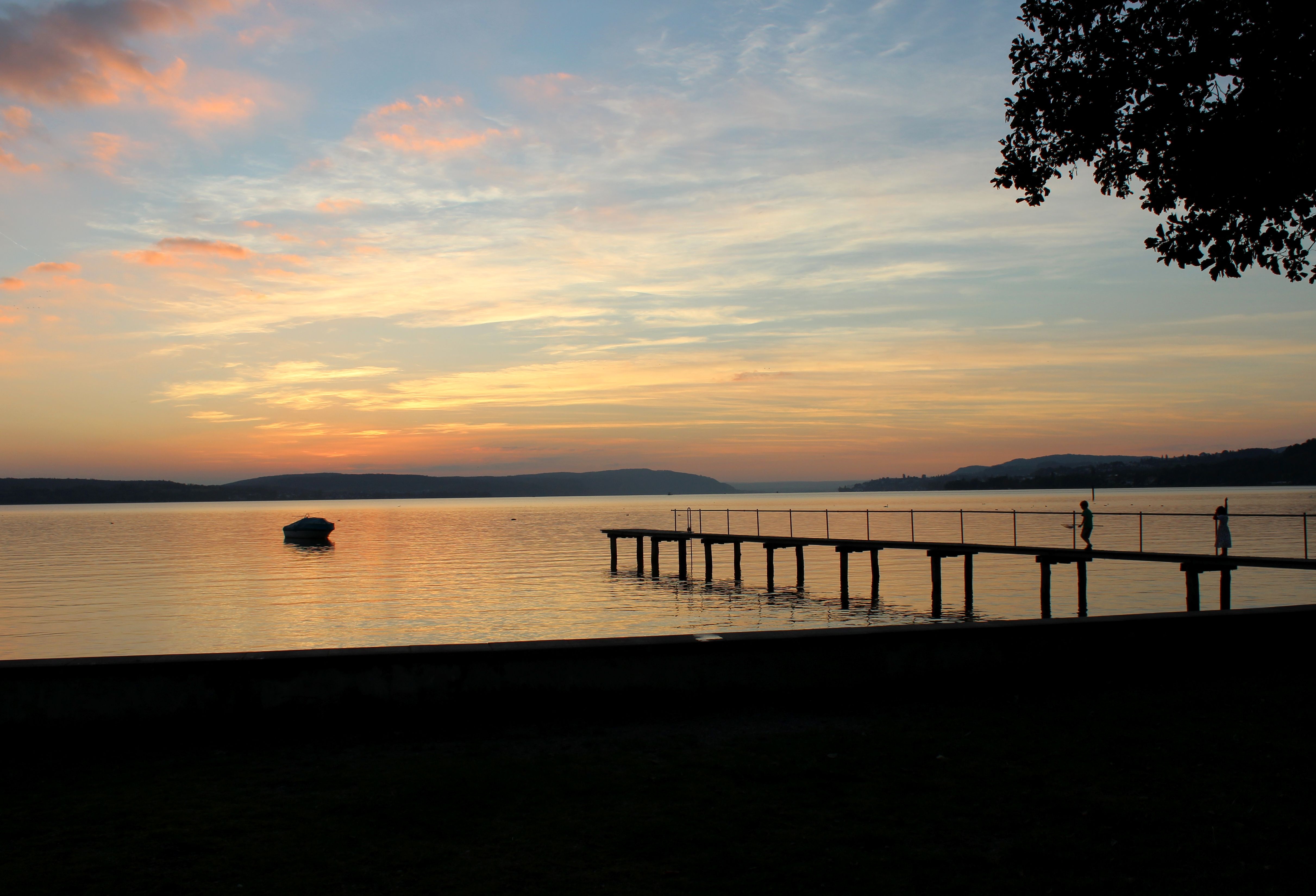 Pier and boat at sunset free image download