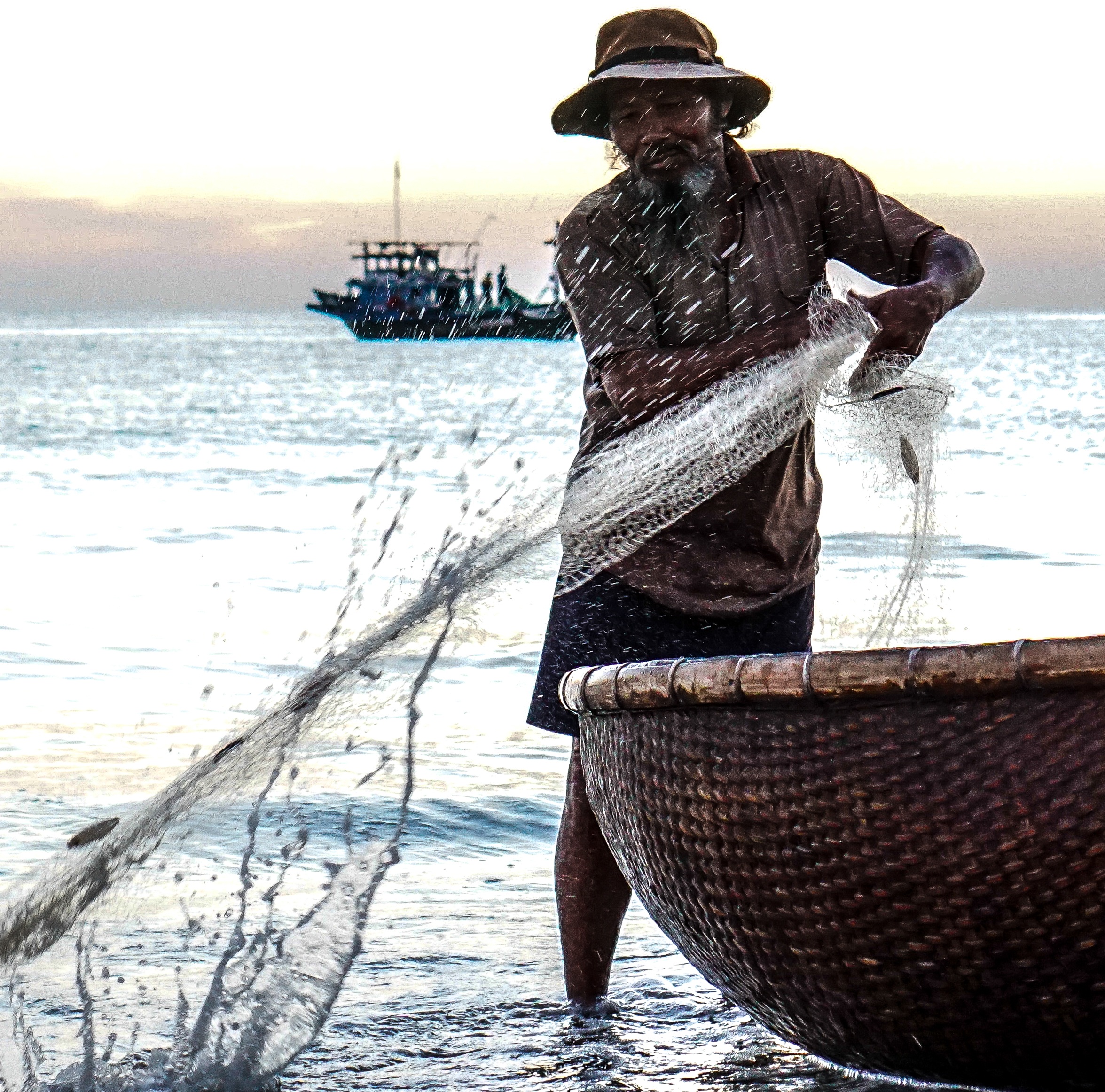 Man with a fishing net free image download