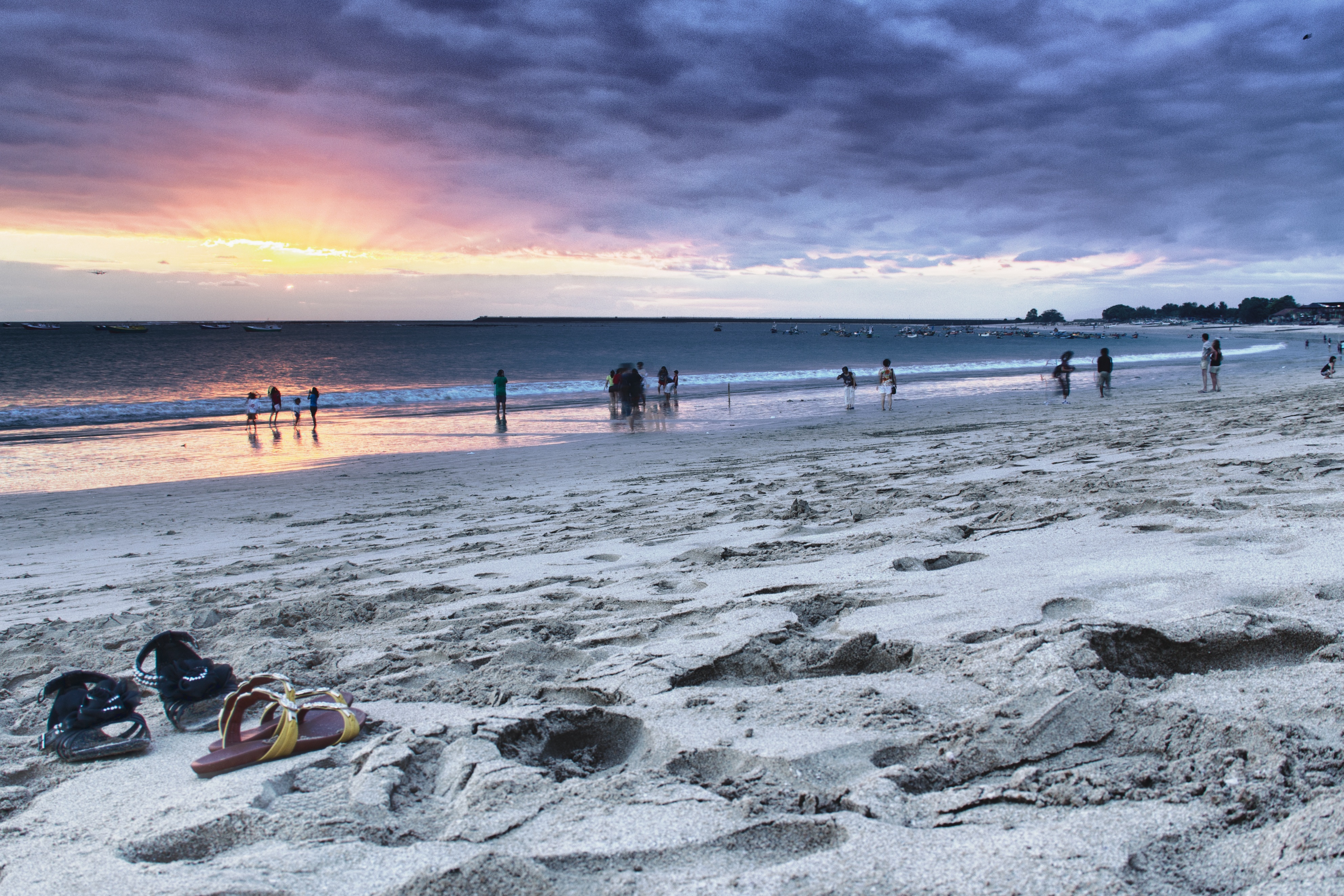Sandals on Ocean Beach at scenic landscape free image download