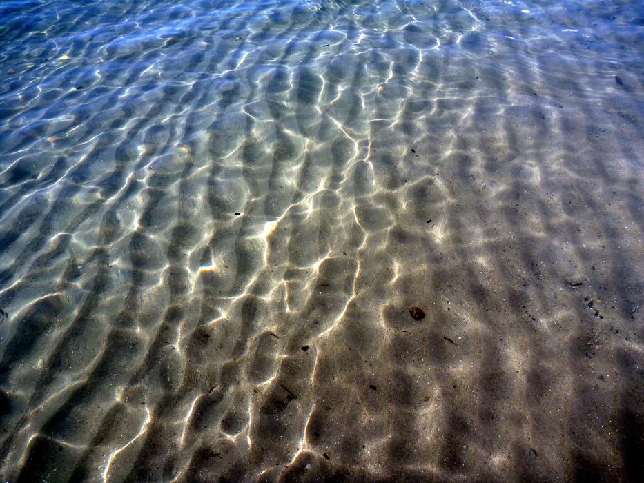 Flickering Waves over seabed near beach free image download
