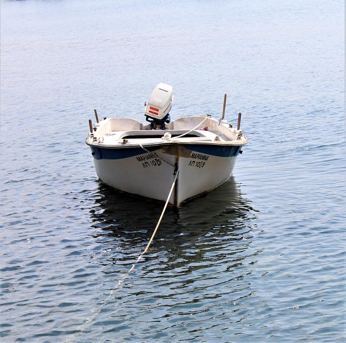 Moored white motor Boat on water free image download