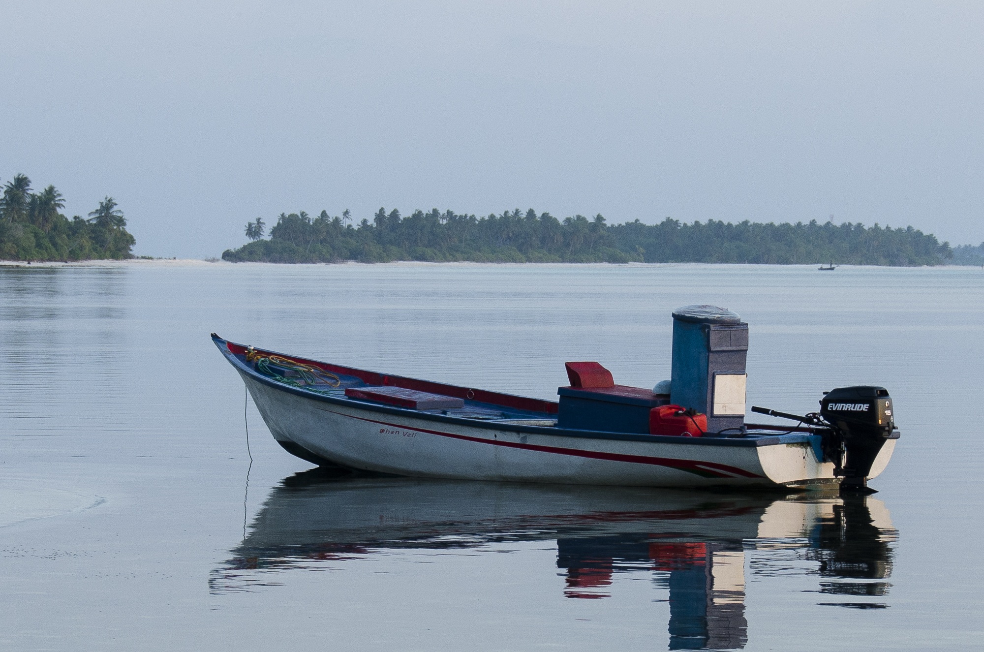 A lonely boat far from the shore free image download