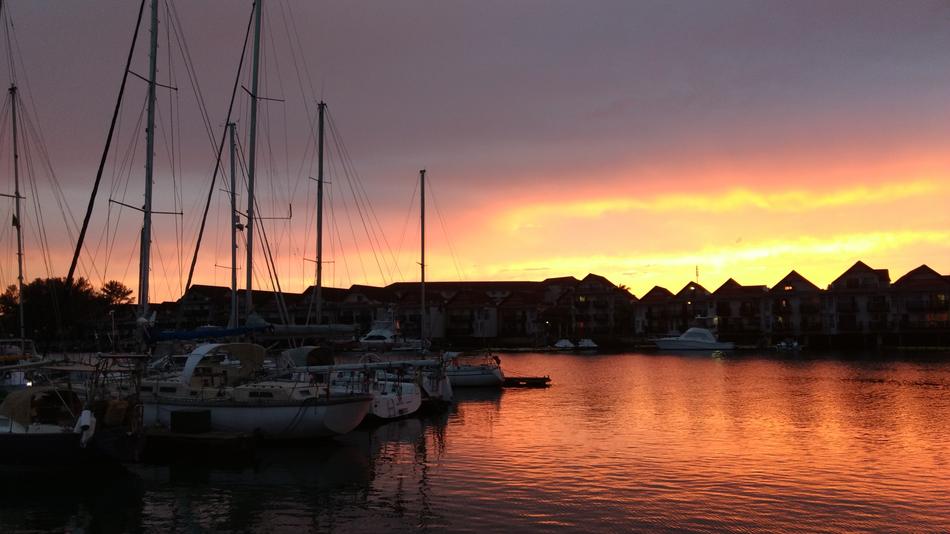 Sunset over Sea port view free image download