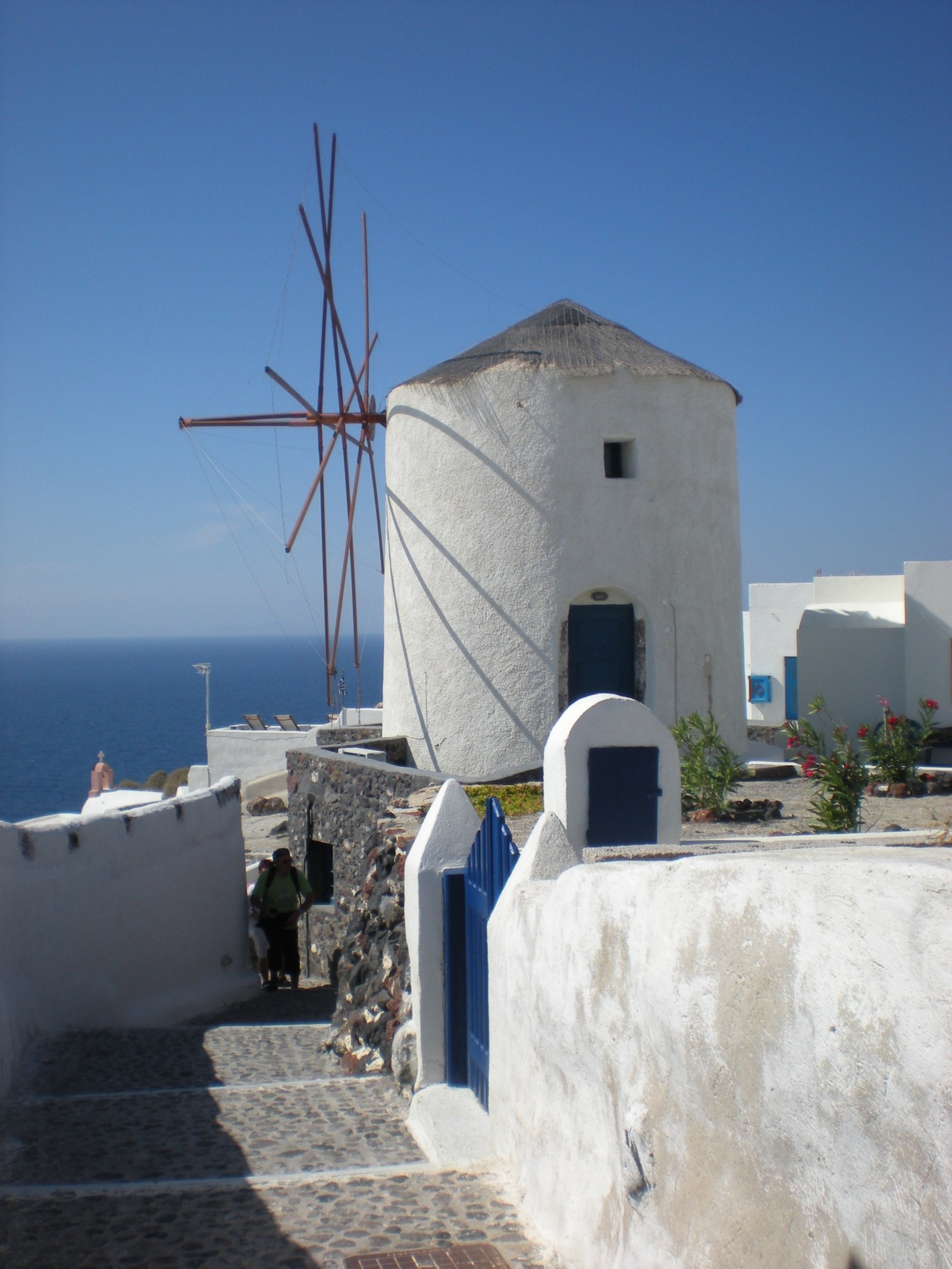 Traditional windmill on seaside, Greece, Santorini, oia free image download