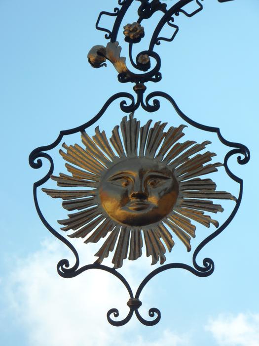 Iron sign with sun free image download