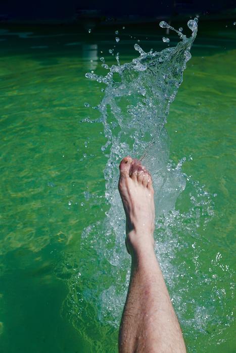 Foot with splash of water free image download