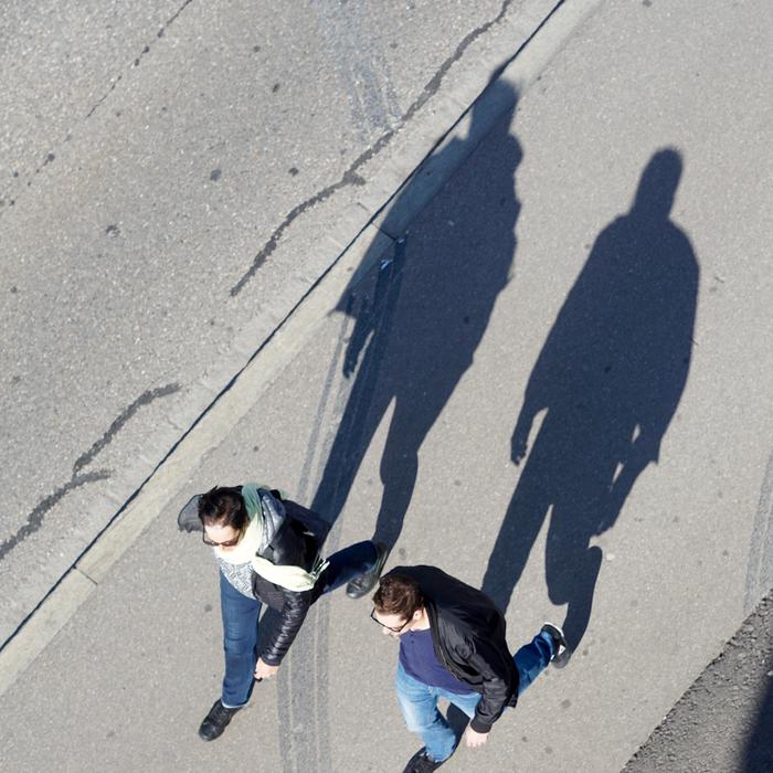Shadow behind people free image download