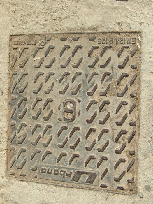 Iron manhole cover with patterns free image download