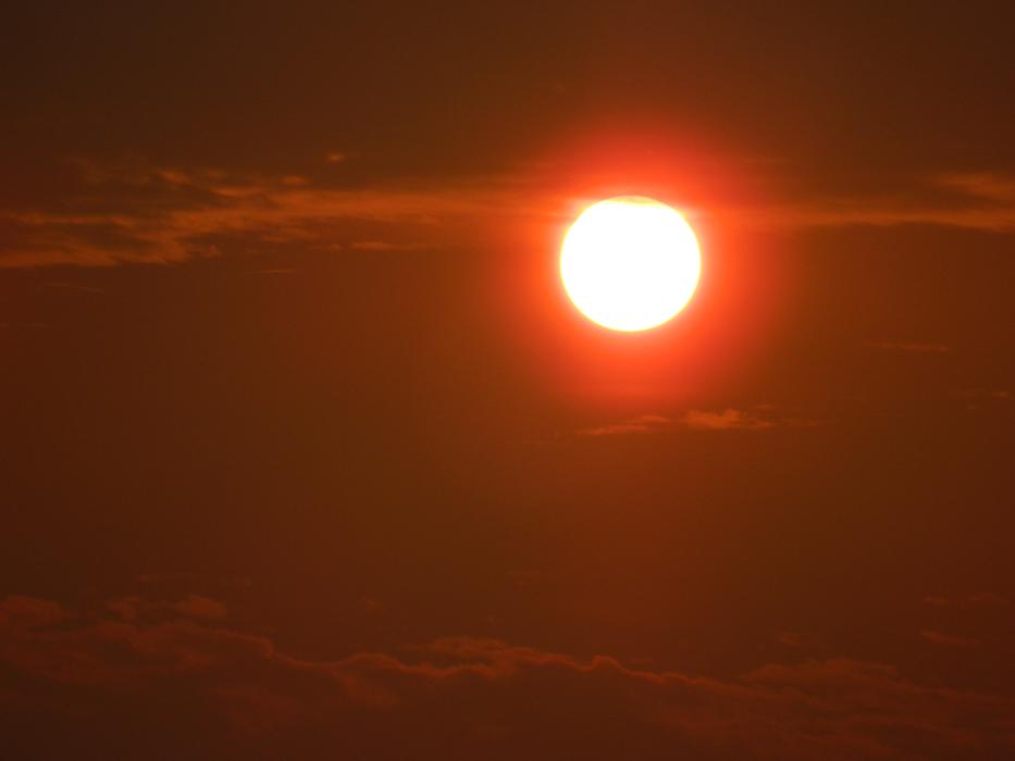 Red sun with a fiery sunset free image download