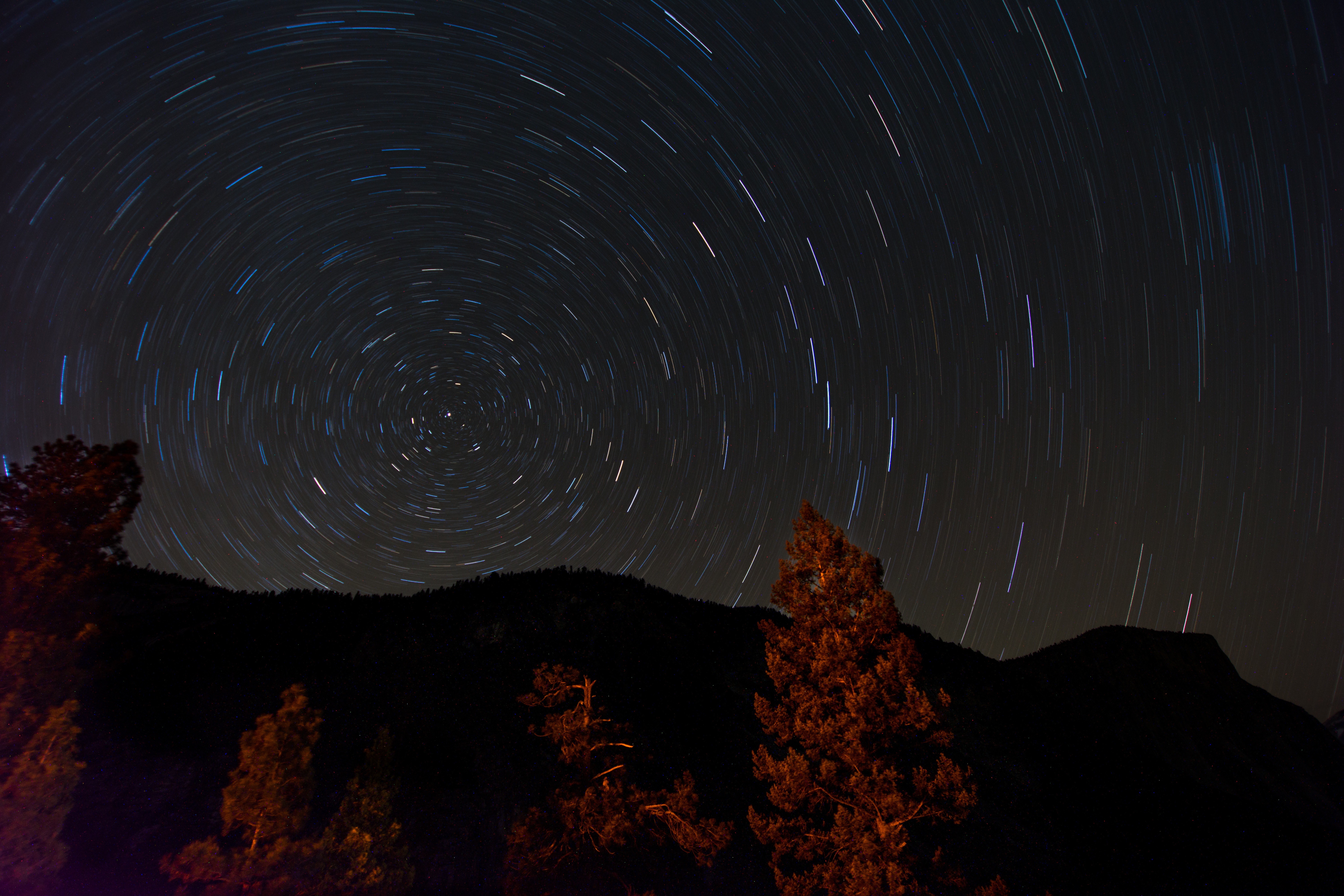 Stars over mountains, tracks at Night Sky free image download