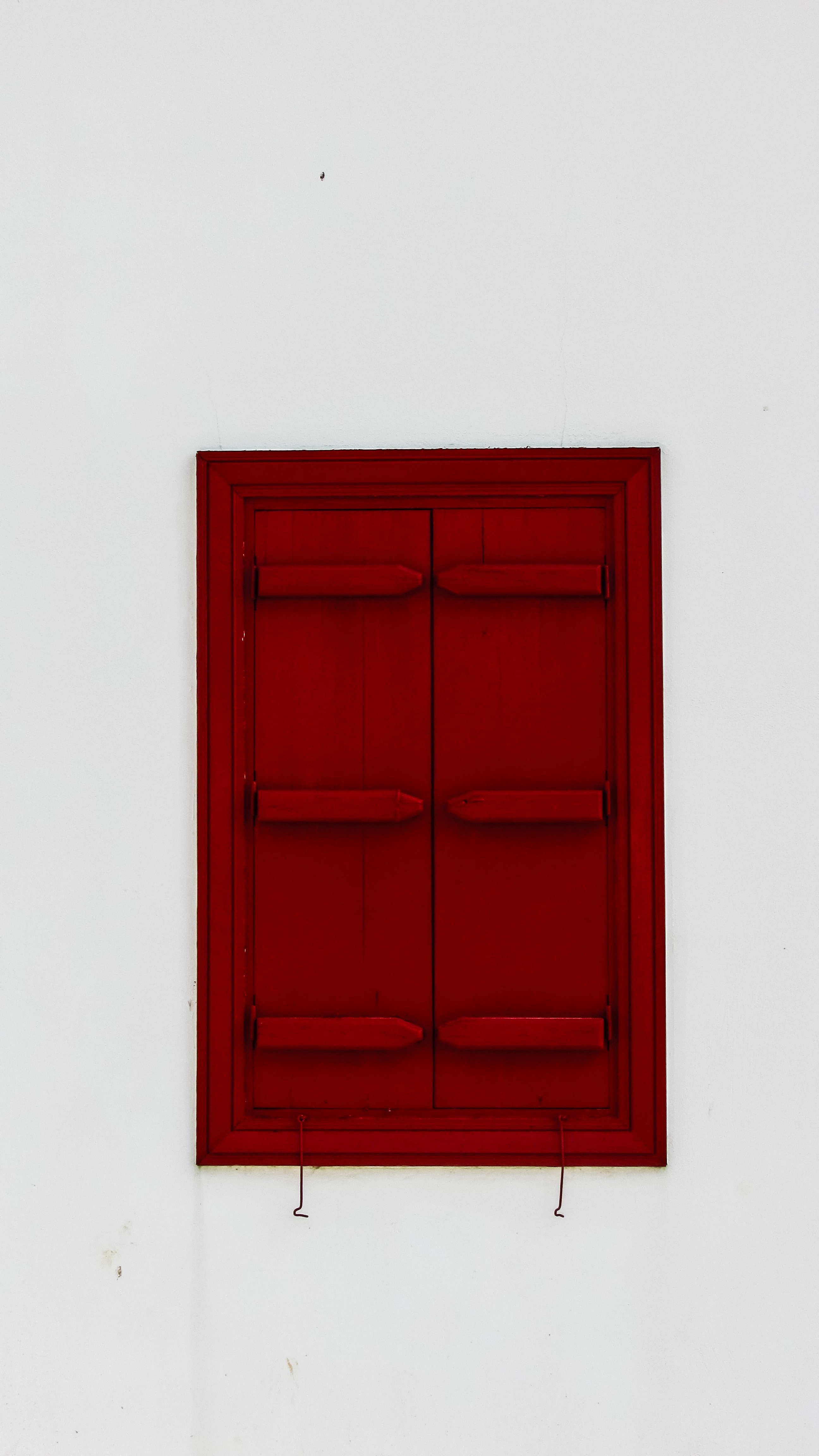 Red wooden shutters in the house free image download