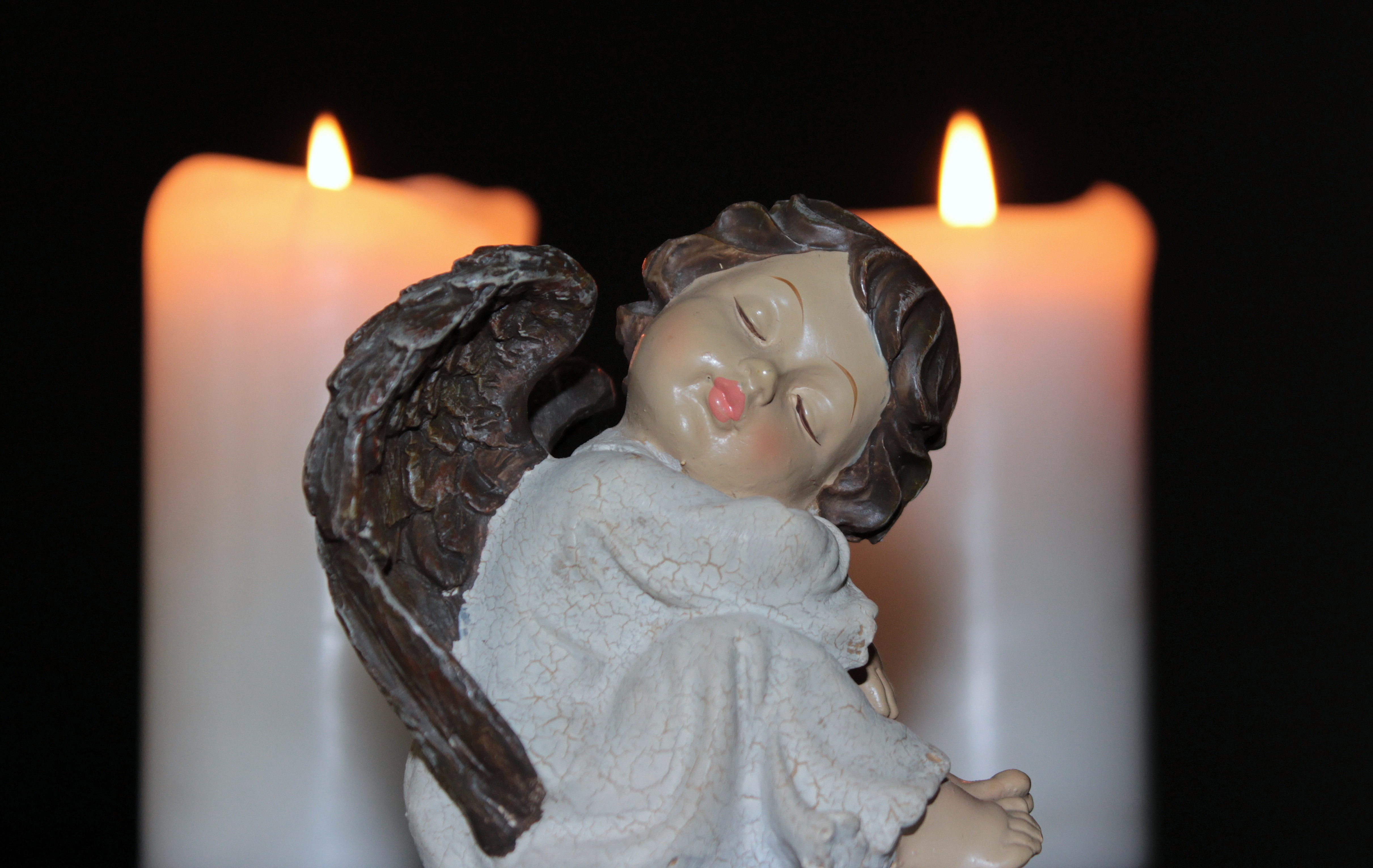 Angel figure and candles free image download