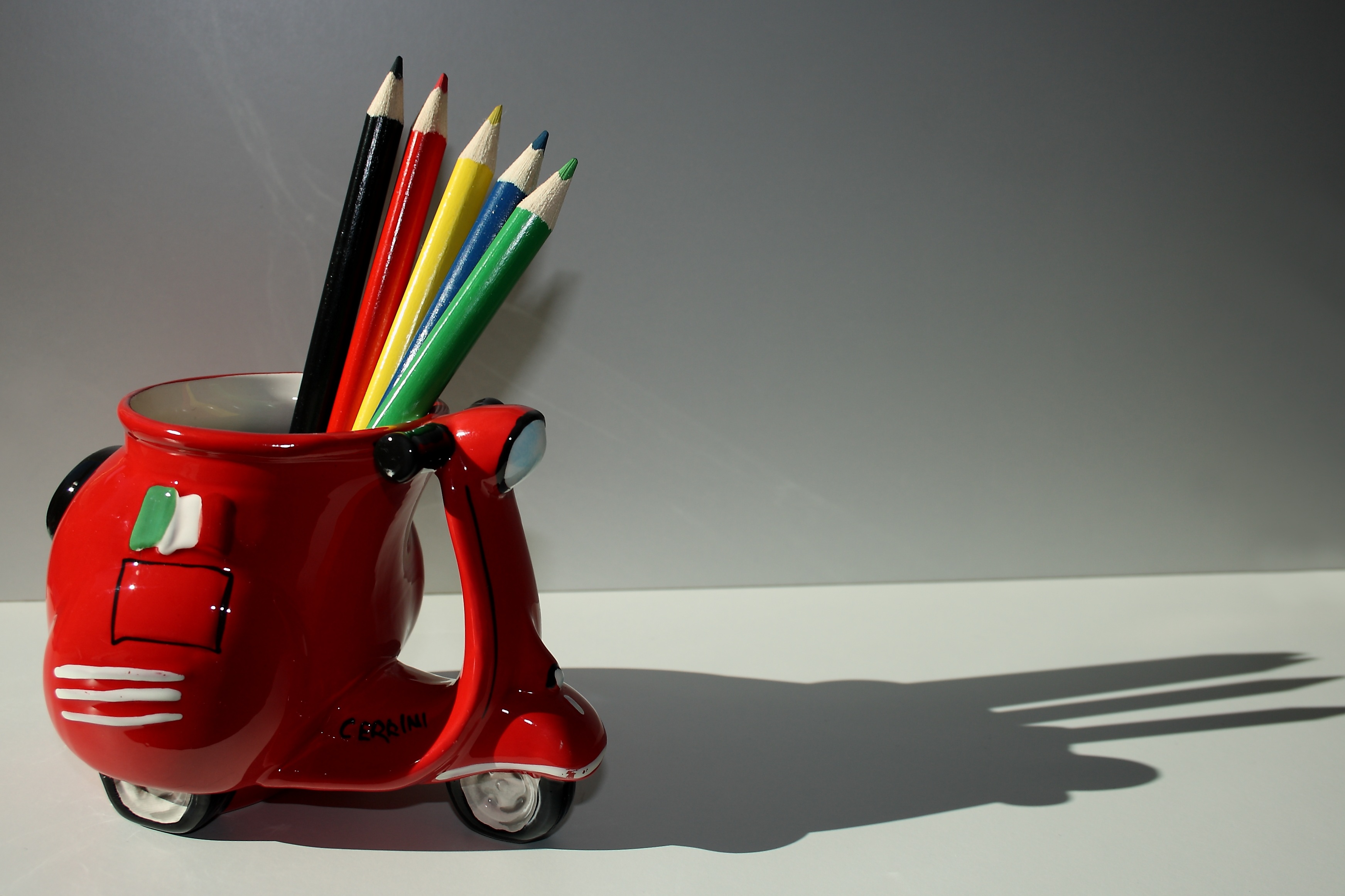 Pencils in red scooter shaped cup free image download