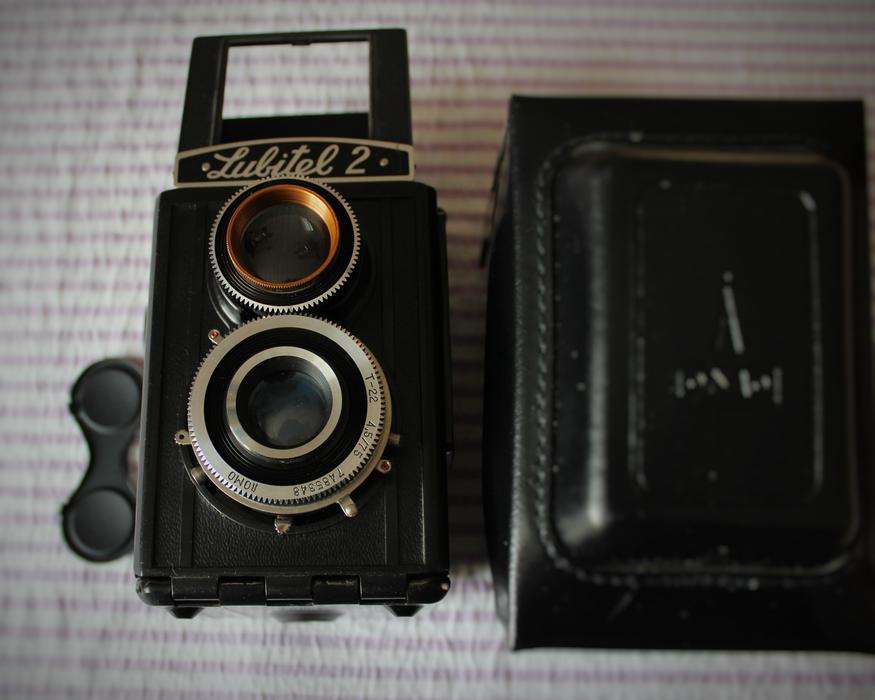 Beautiful old camera on the table free image download