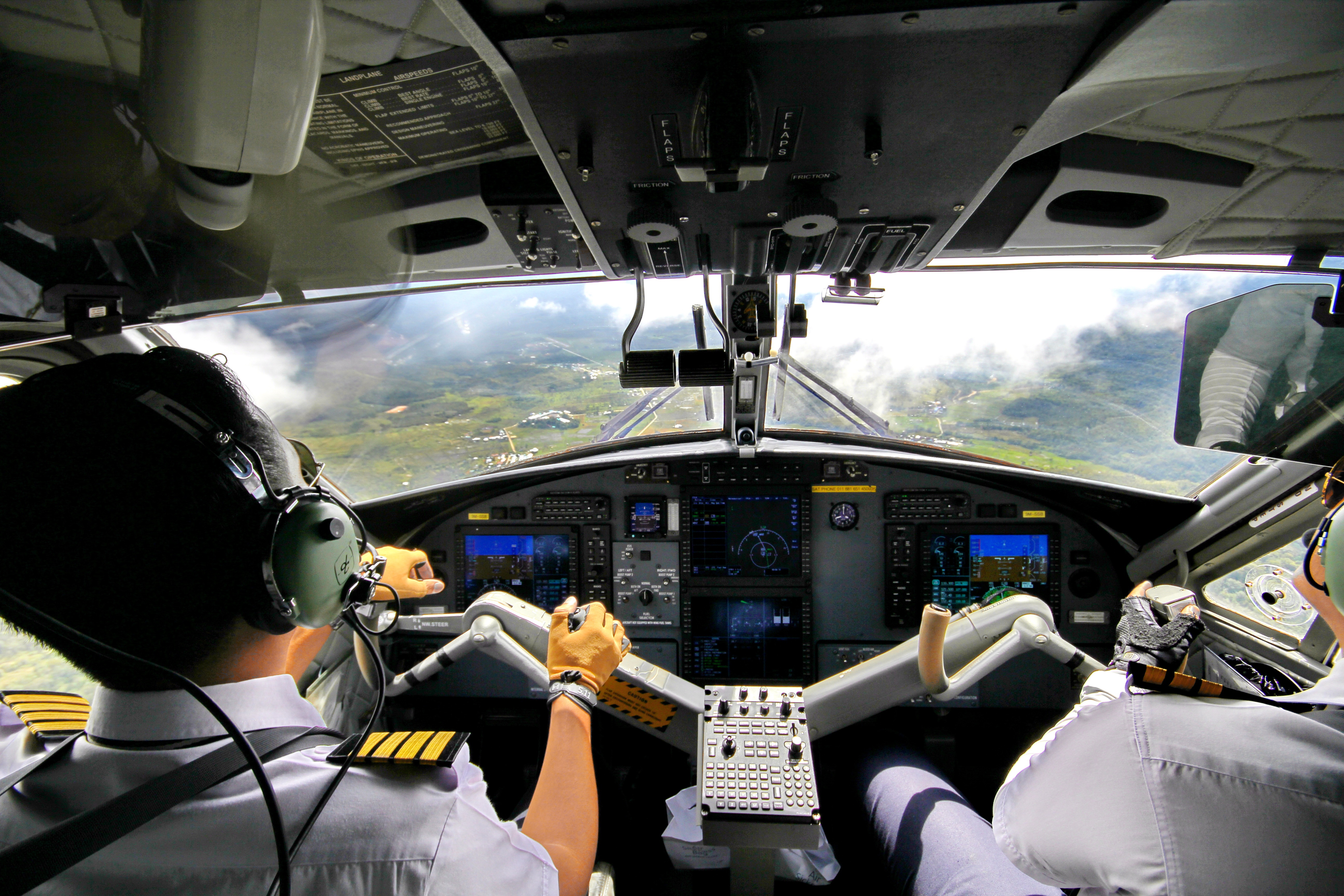 Male pilots in the cockpit planes free image download