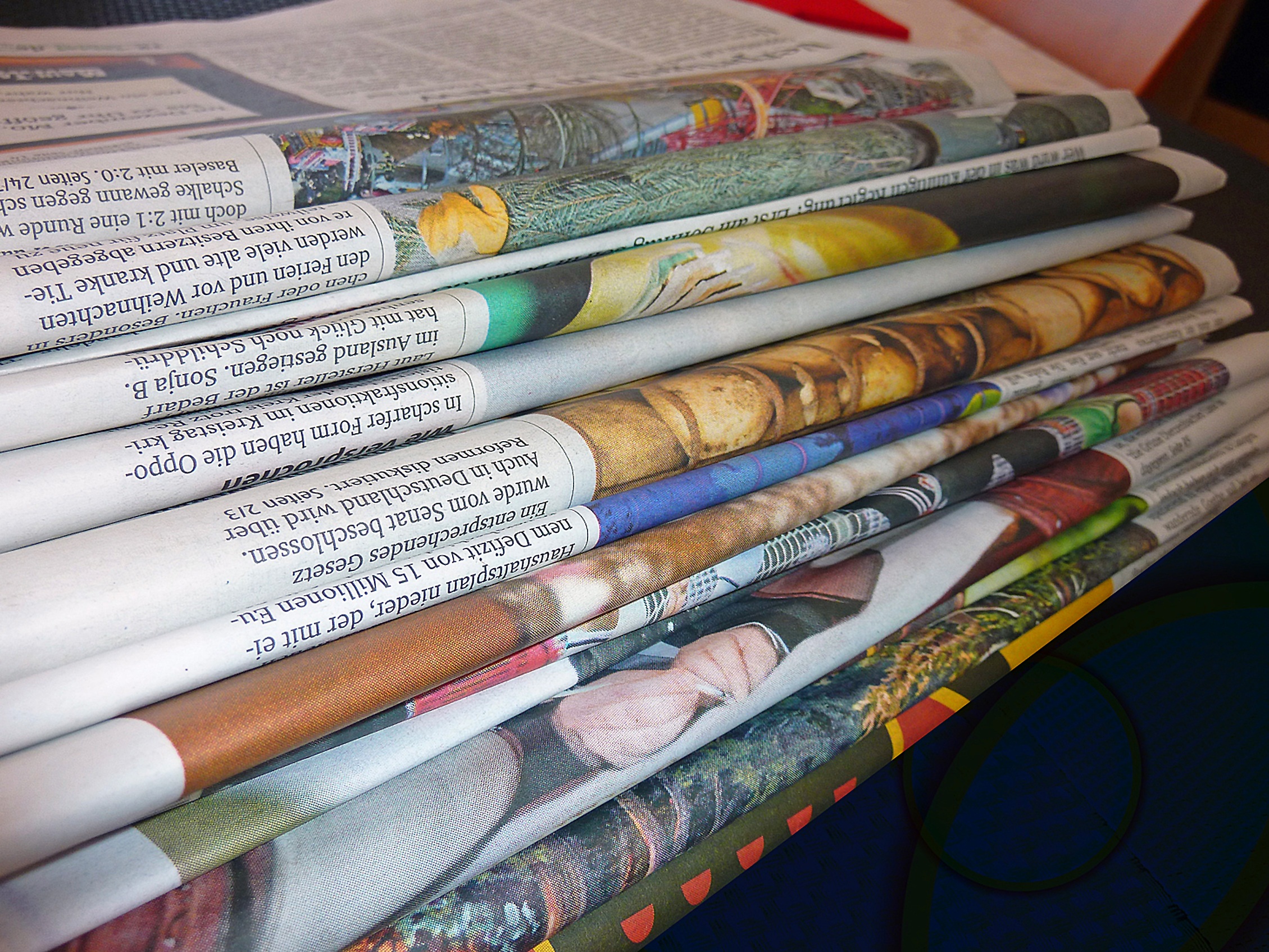 Folded newspaper on the table free image download