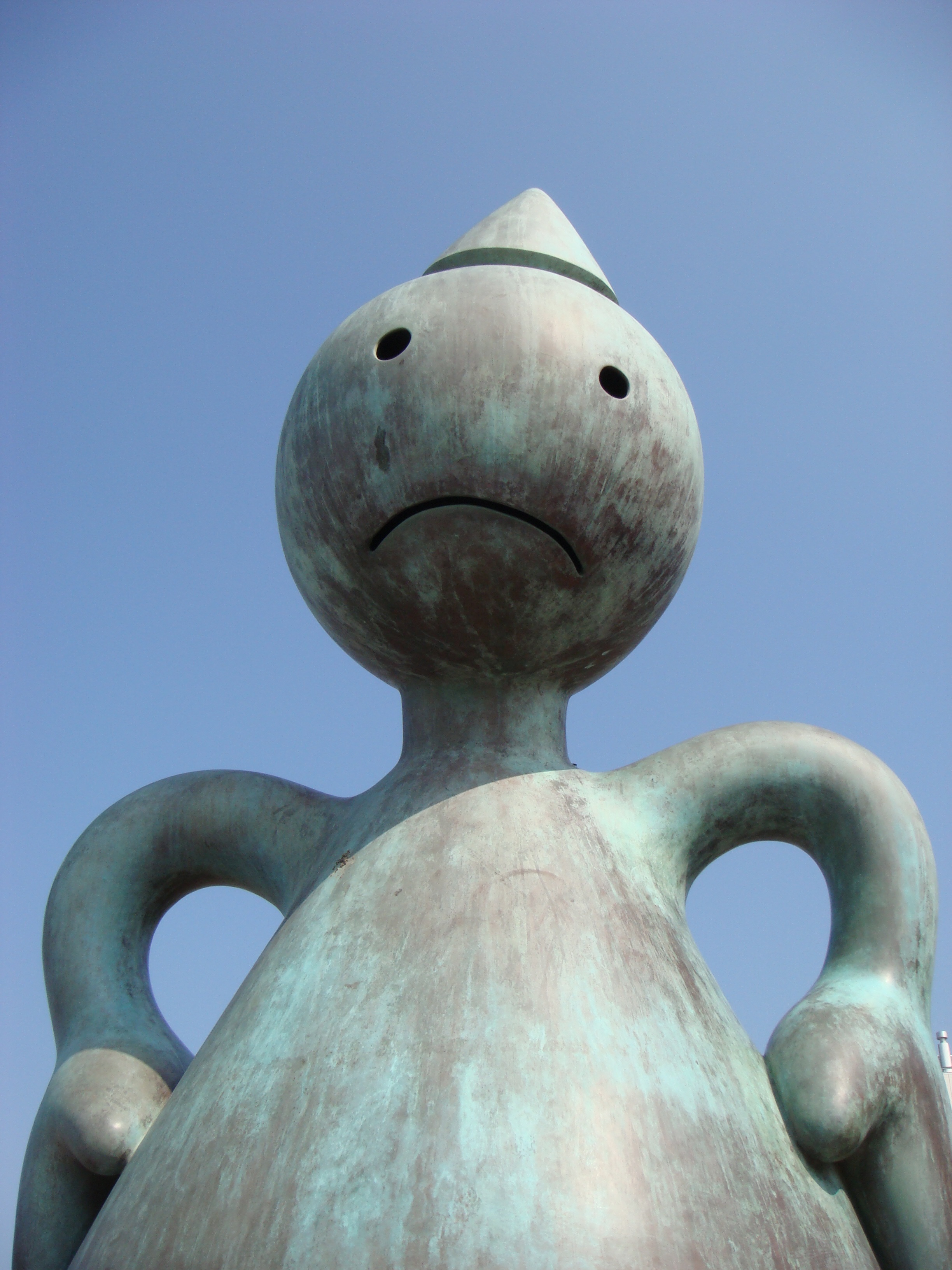 Sad stone sculpture free image download