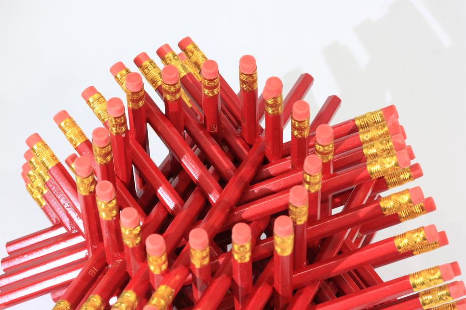 Red wooden pens in a stack free image download