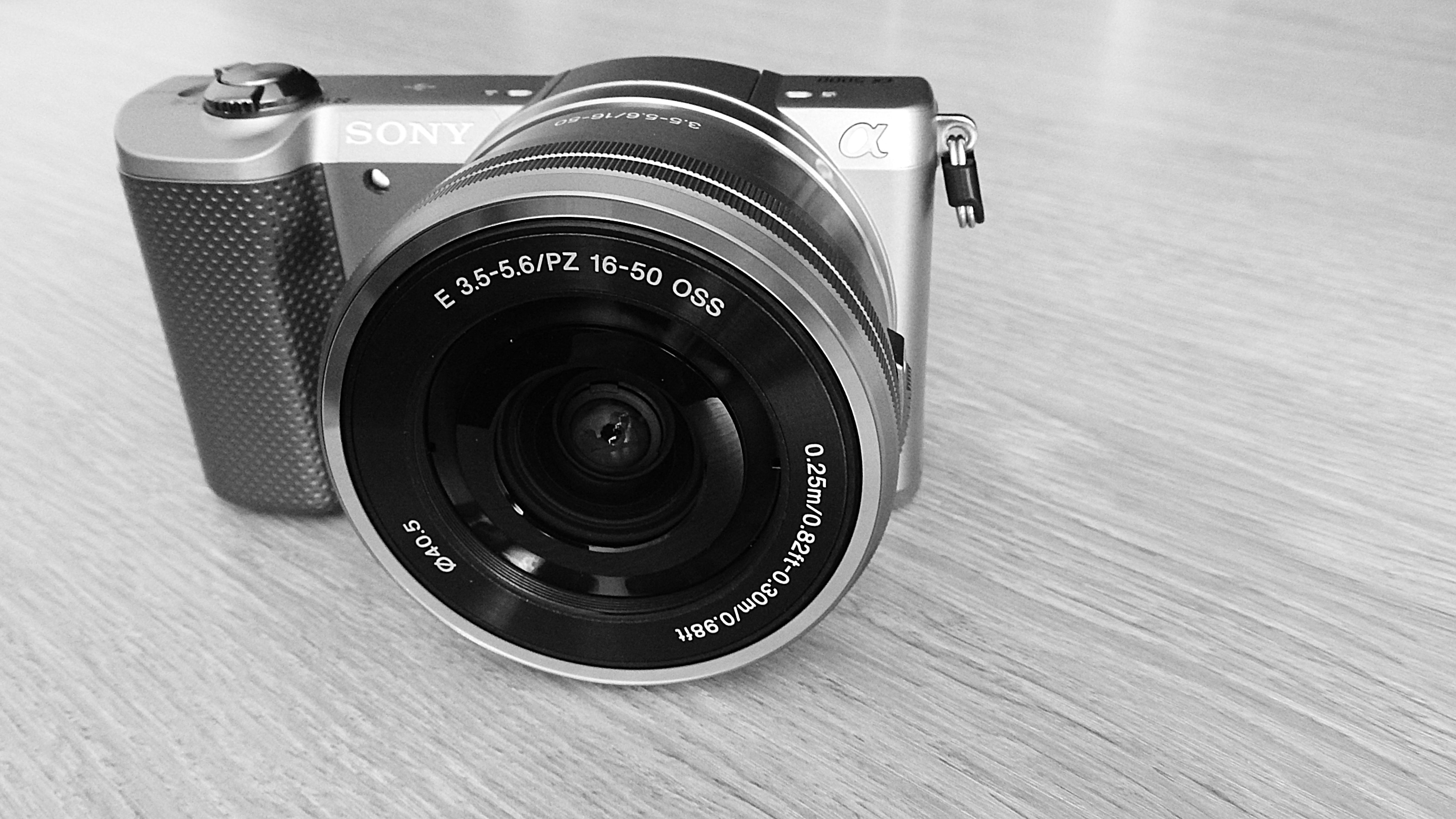 The digital camera on the table is new free image download