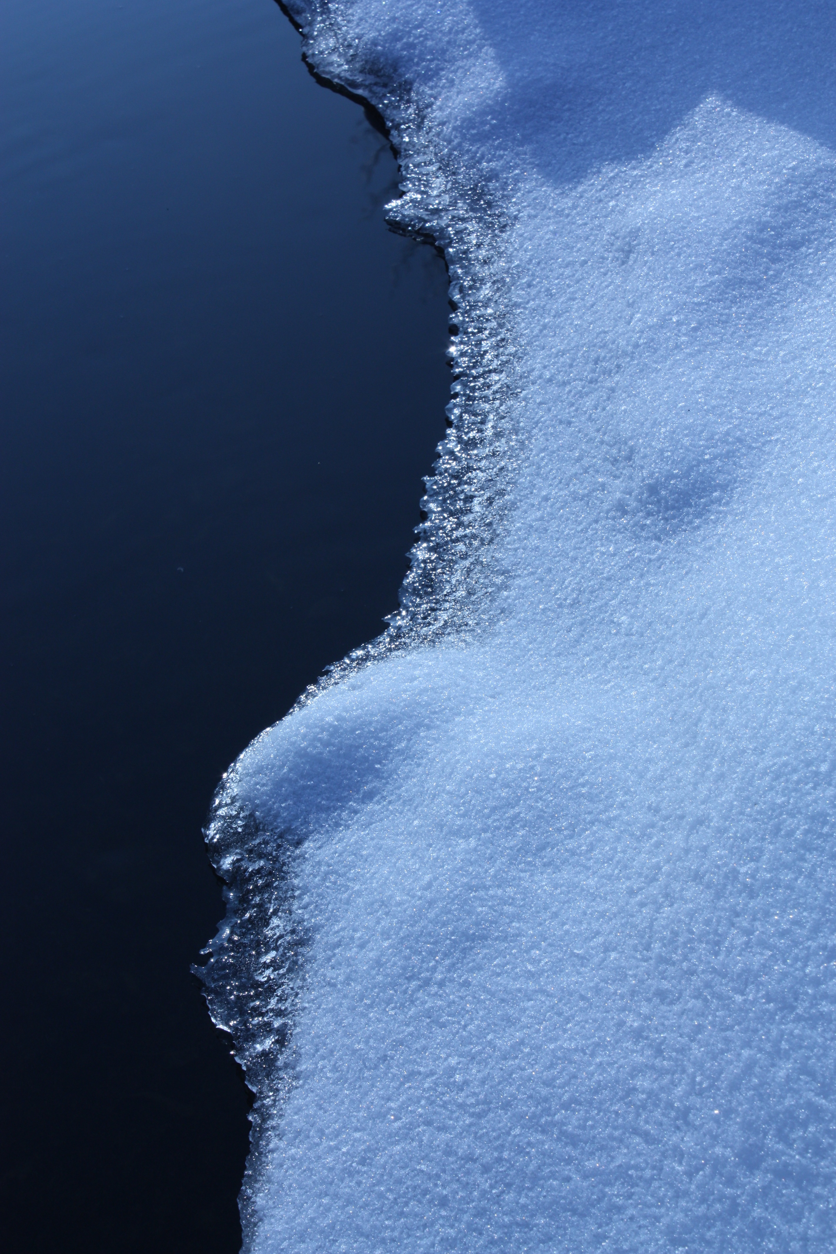 Cold snow by the water free image download