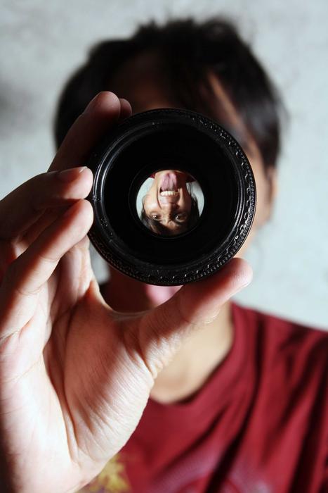 Hand Lens and Man free image download