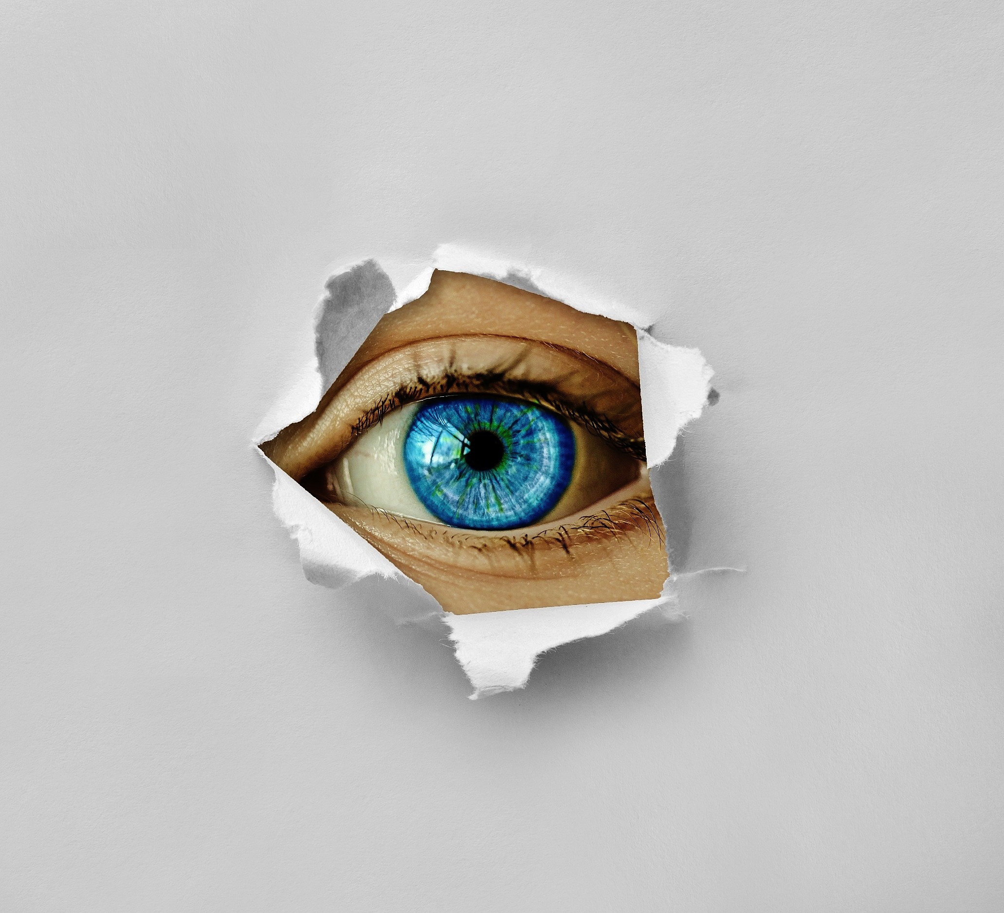 Drawing of an eye in torn paper free image download