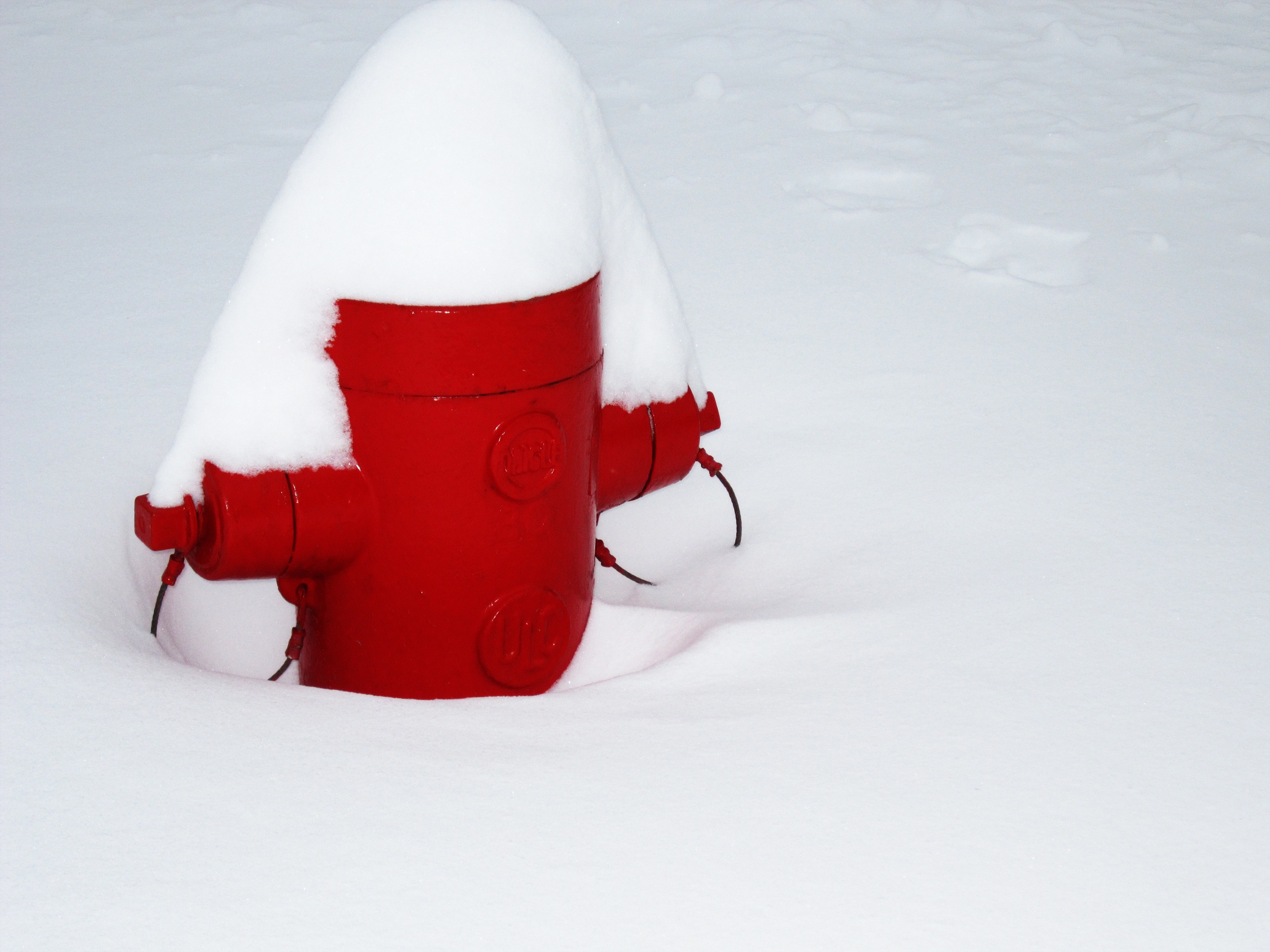 Red fire hydrant under the snow free image download