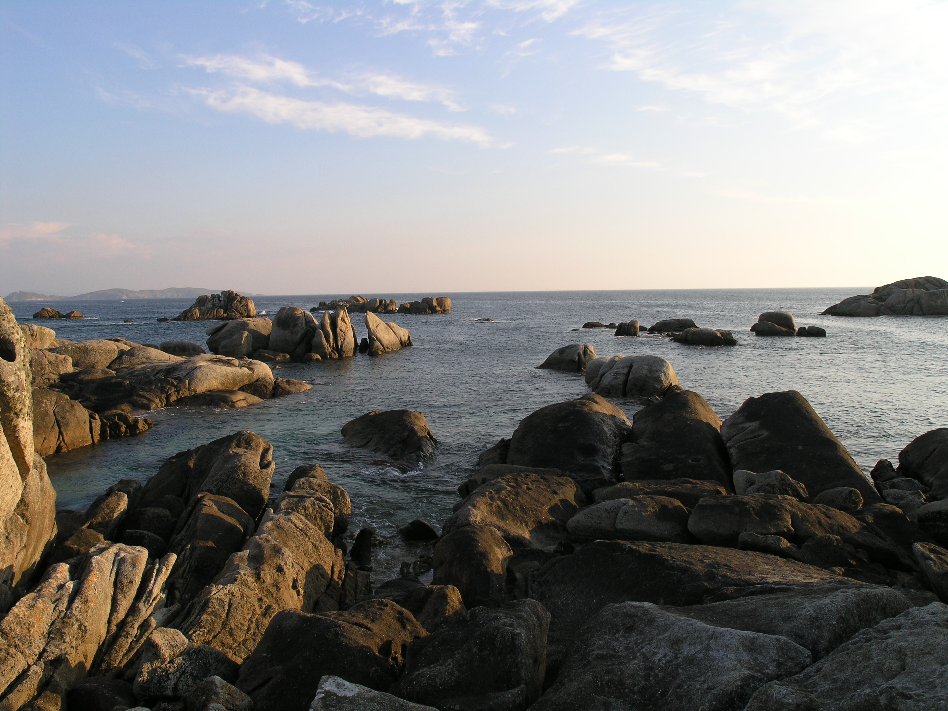 Rocky cliffs in the sea free image download