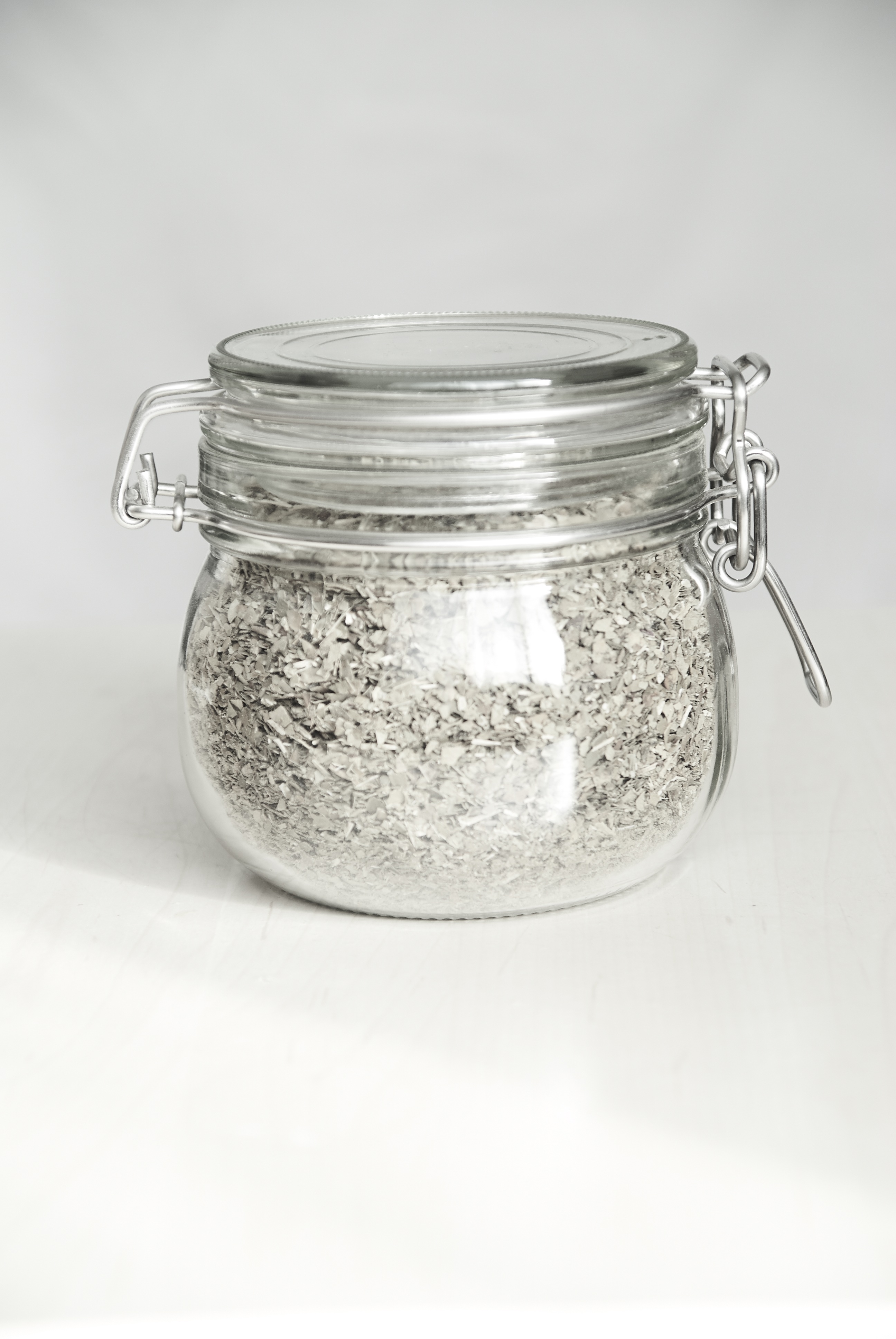 White sand in a glass jar free image download