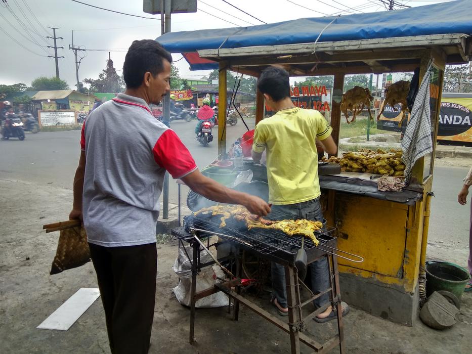 People cook on the grill free image download
