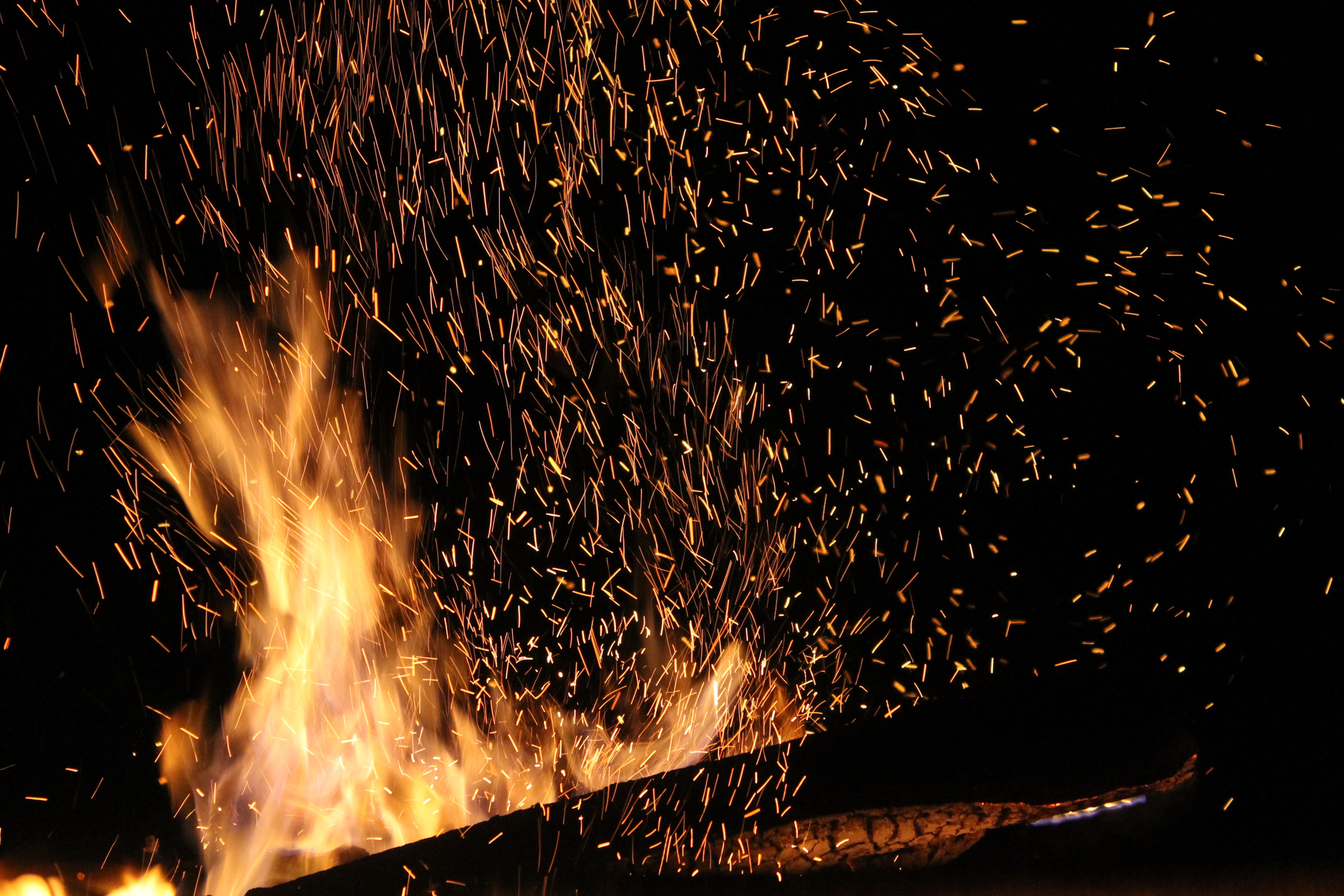 A fire burning hot with big sparks free image download