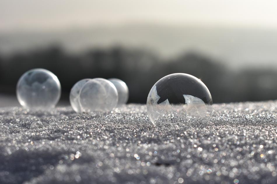 Bubbles frozen in white snow cold free image download
