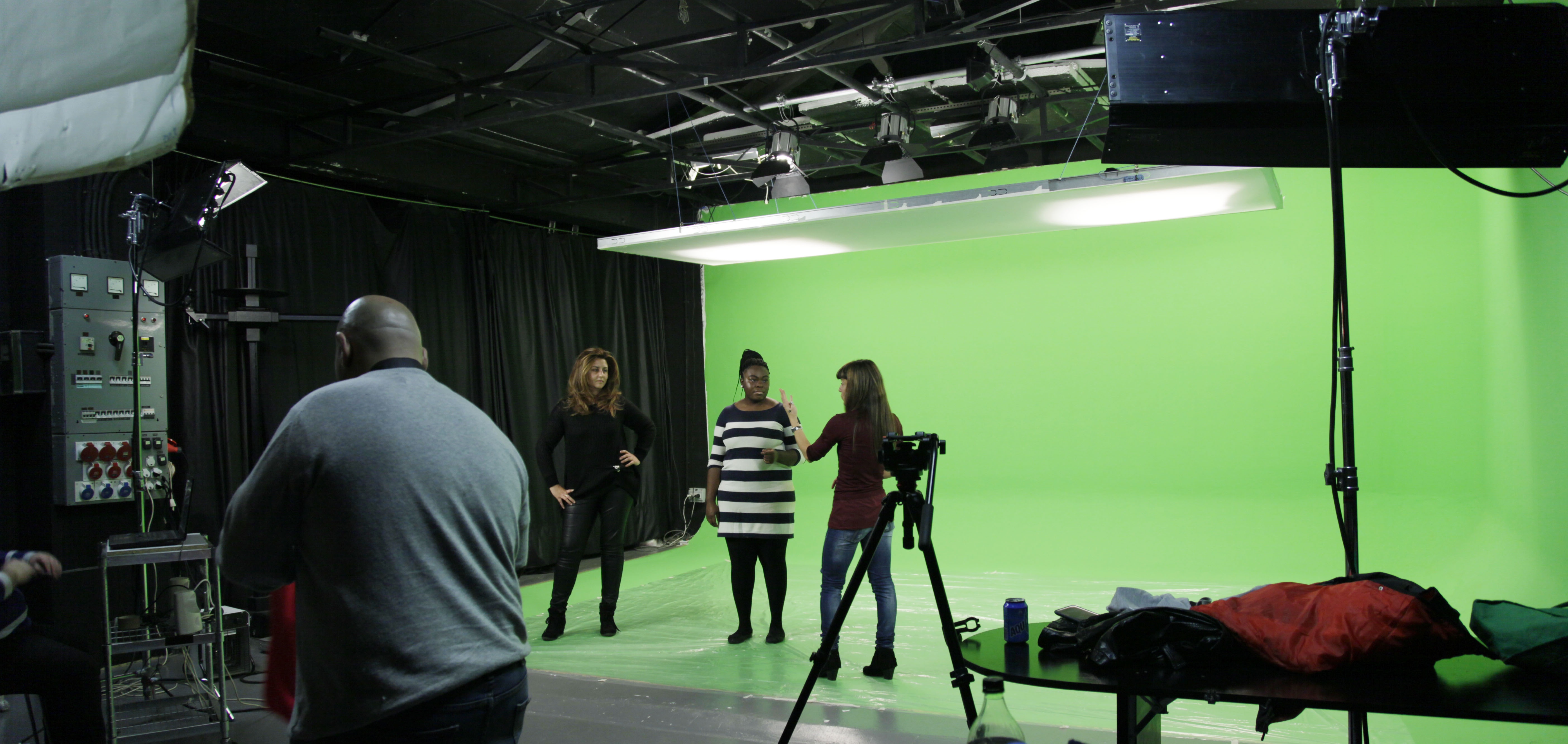 People in the studio on a green background free image download