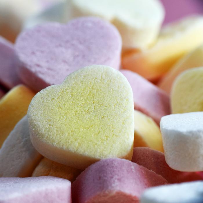 Colored candies in the shape of hearts free image download
